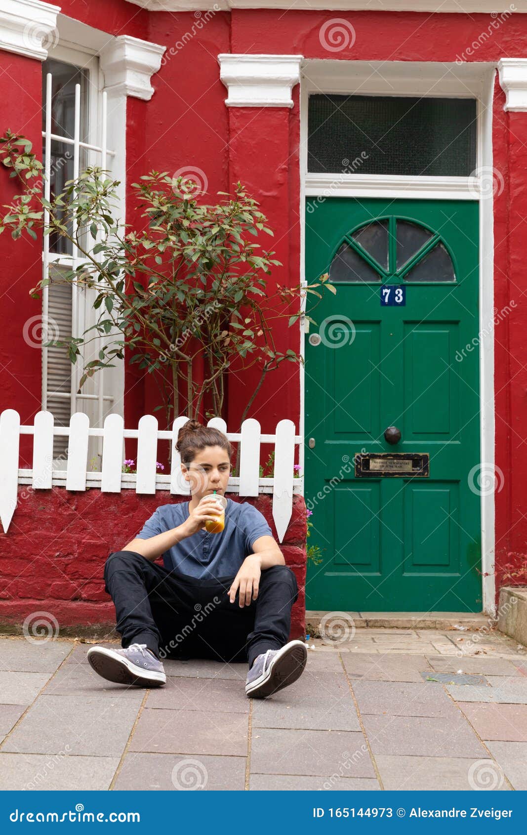 Young Boy is Sitting Outside the Home Stock Image - Image of outdoor ...