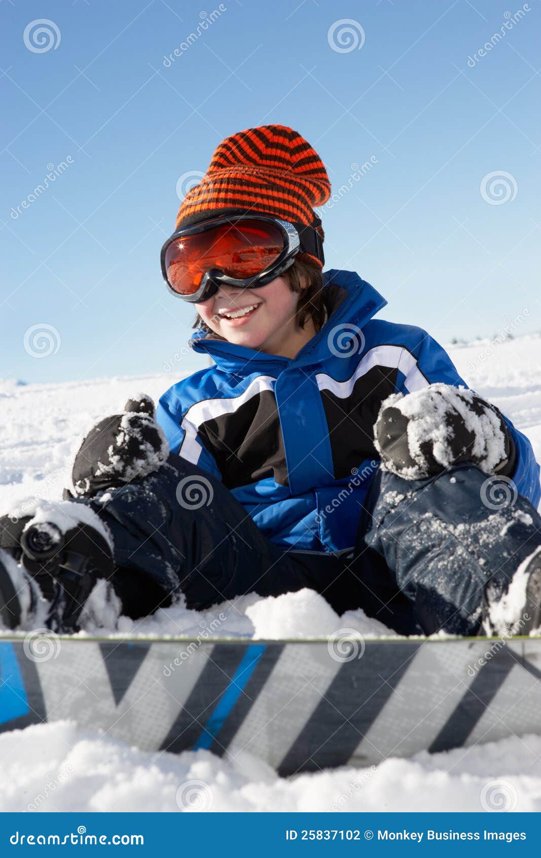 Young Boy Sitting in Snow with Snowboard Stock Photo - Image of skiing ...