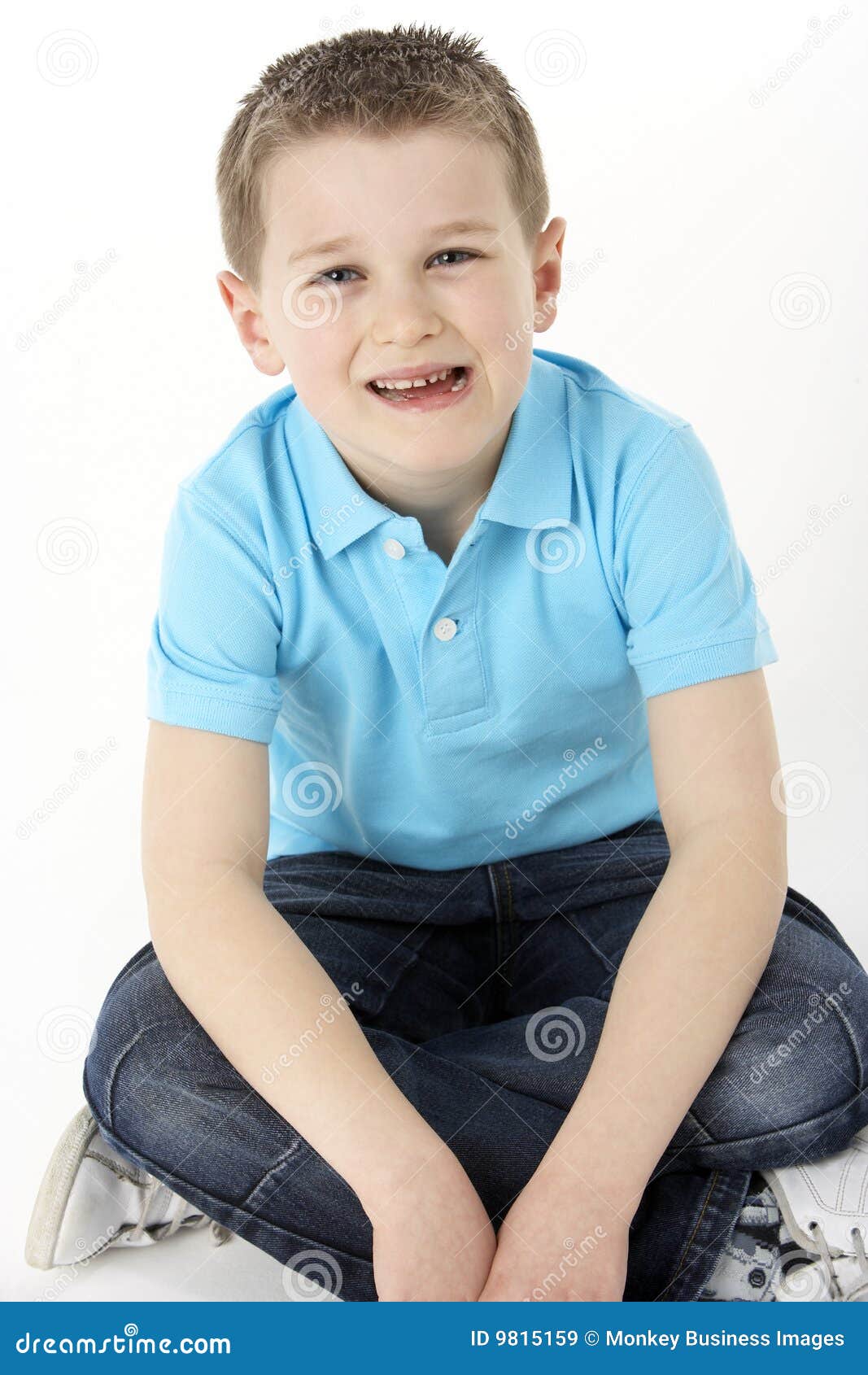 Young Boy Sitting in Studio Stock Image - Image of white, elementary ...