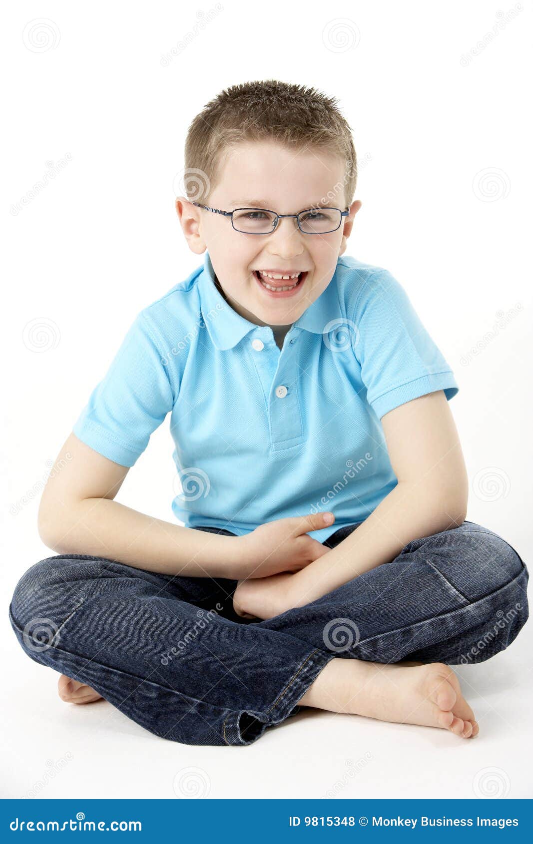 Young Boy Sitting in Studio Stock Photo - Image of space, shot: 9815348