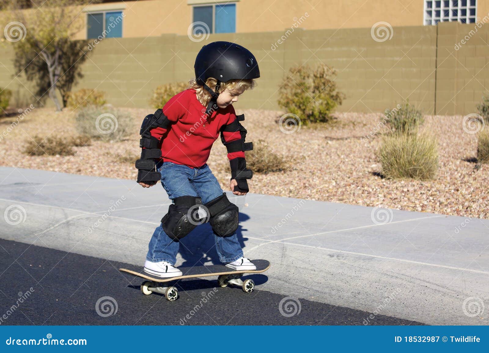 Young Boy on Skateboard stock image. Image of riding - 18532987