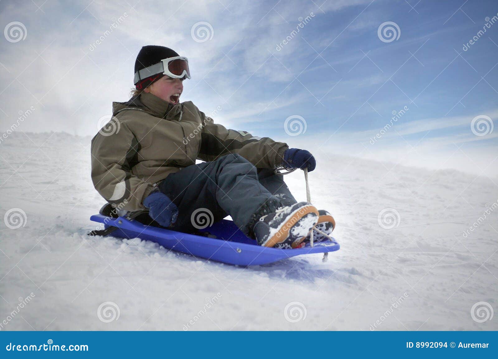 Young boy on sledge stock photo. Image of blond, sledge - 8992094