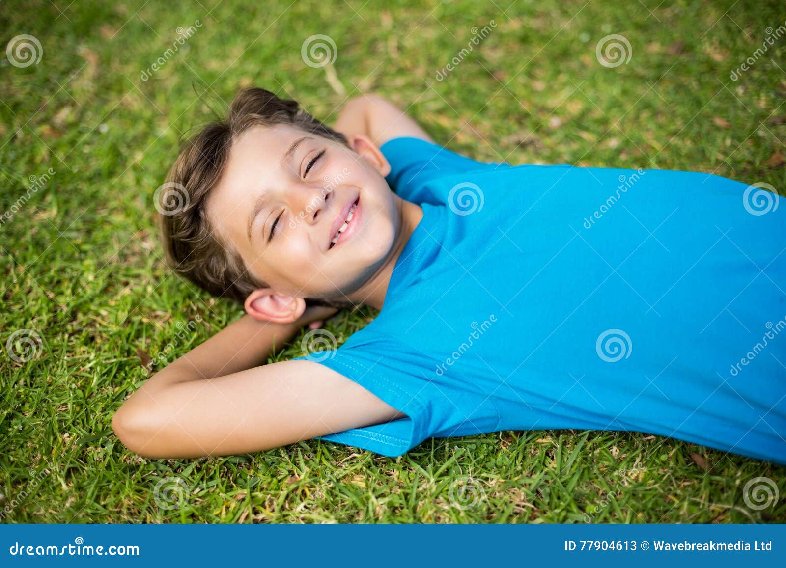 Young boy sleeping in park stock image. Image of closed - 77904613