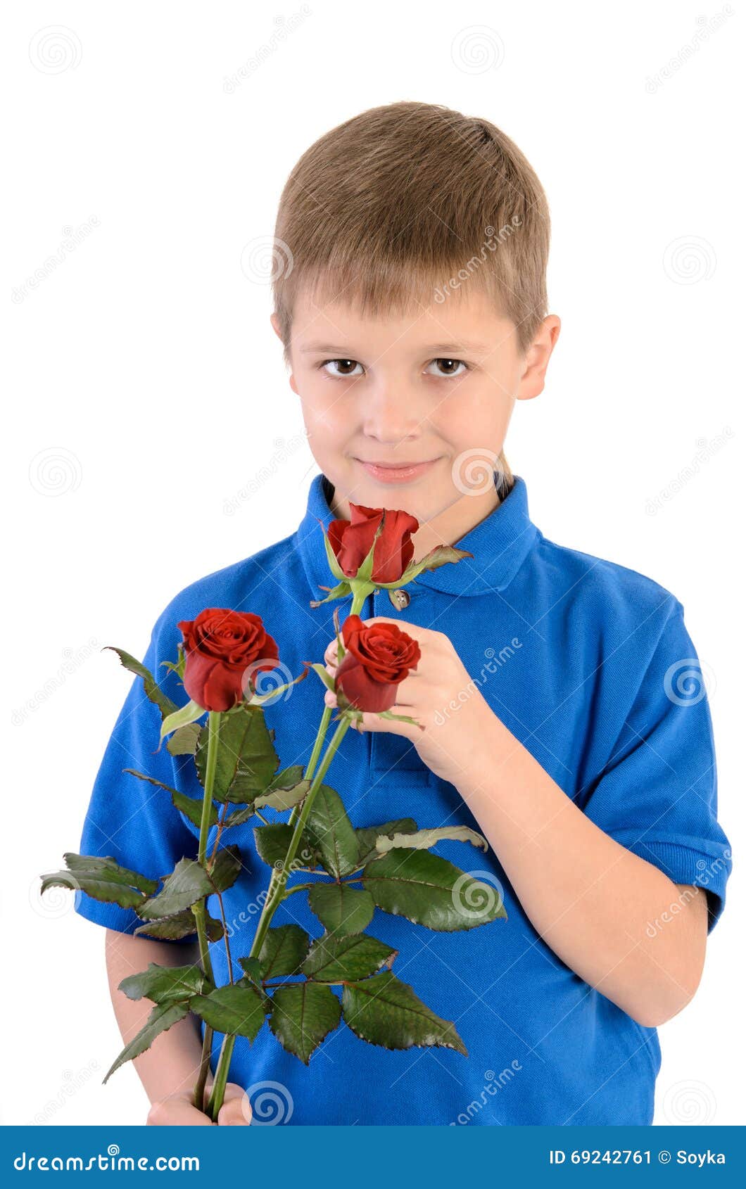 Young boy smelling a rose stock image. Image of data - 69242761