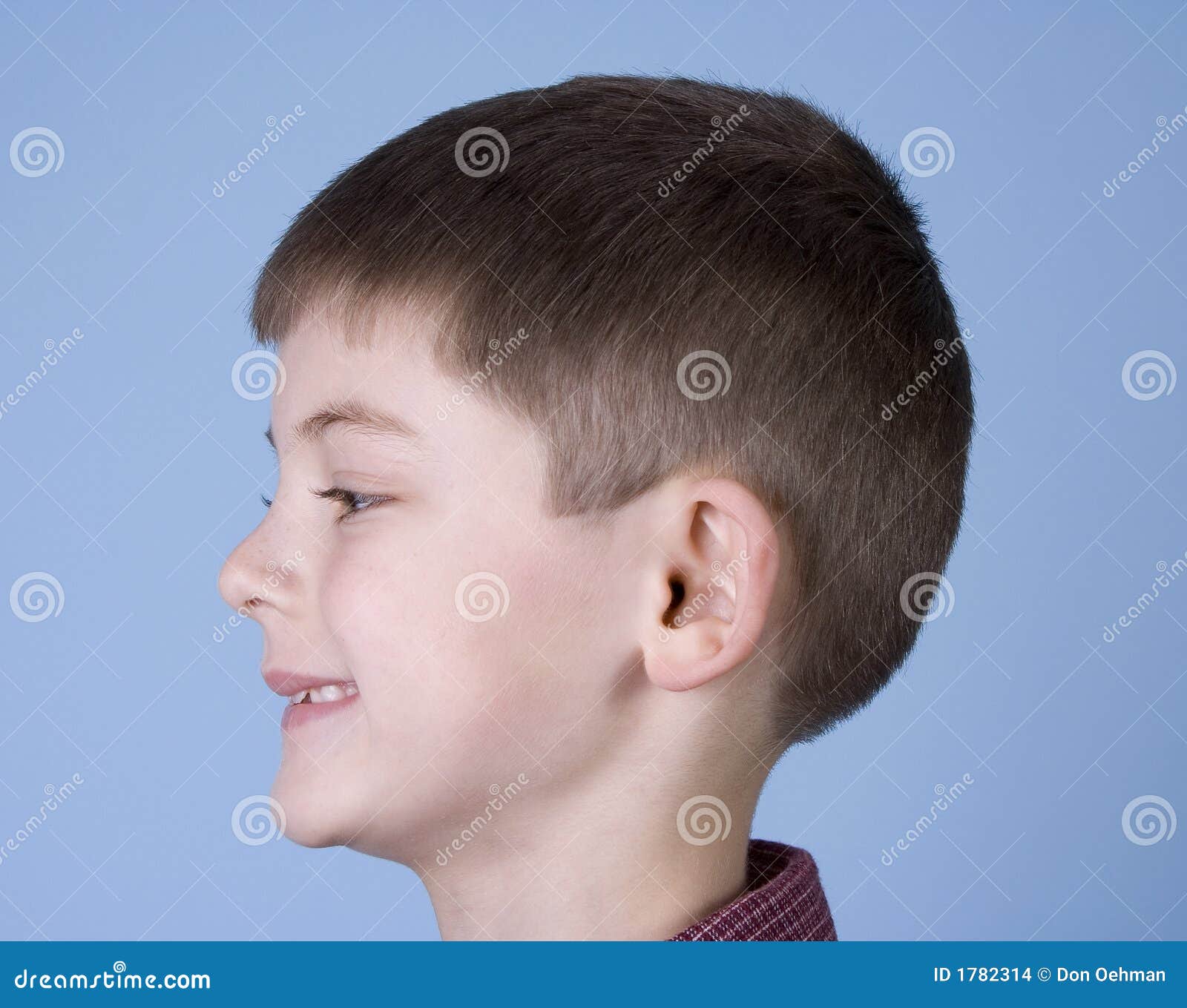 Young Boy Smiling Side Profile Stock Photo - Image of friendly, smiling ...