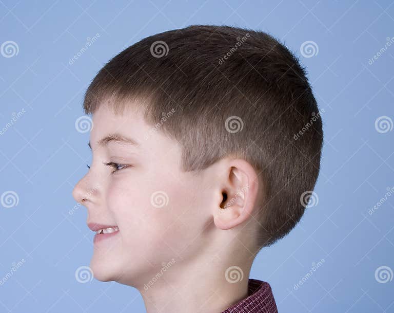 Young Boy Smiling Side Profile Stock Photo - Image of friendly, smiling ...