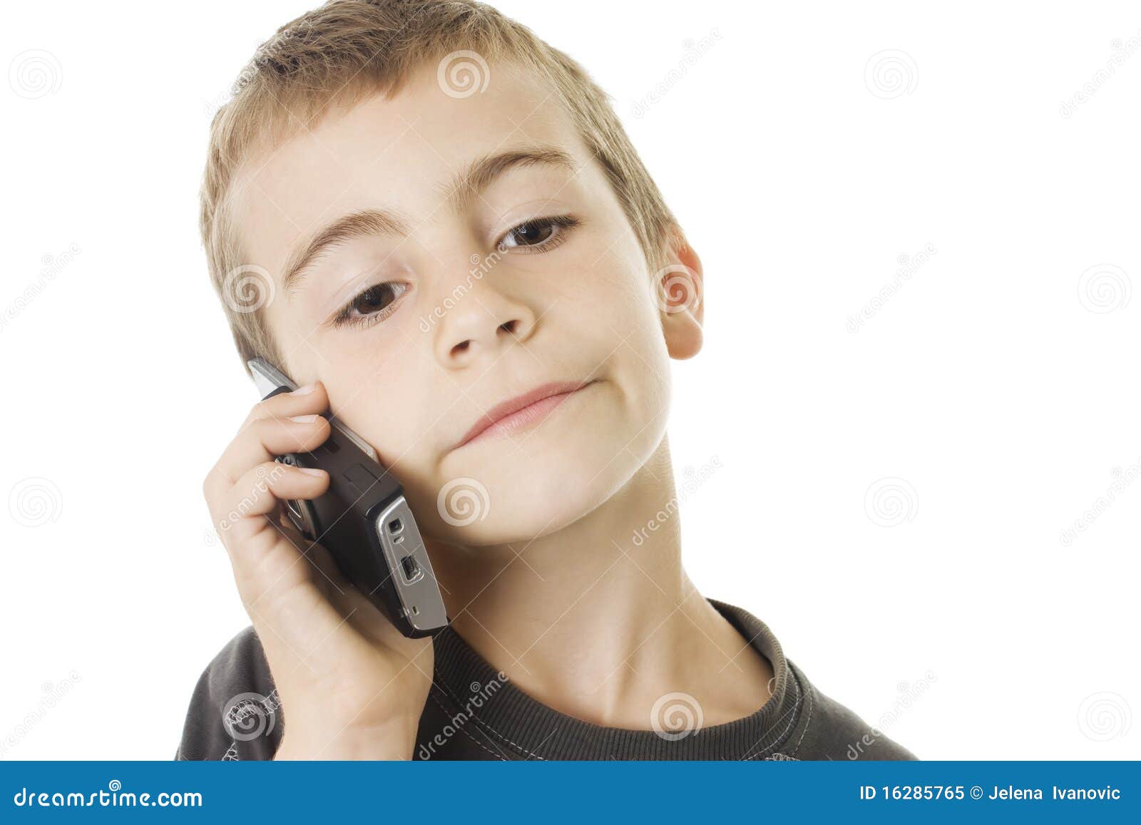 Young Boy Speaking on Cellphone Stock Image - Image of childhood ...