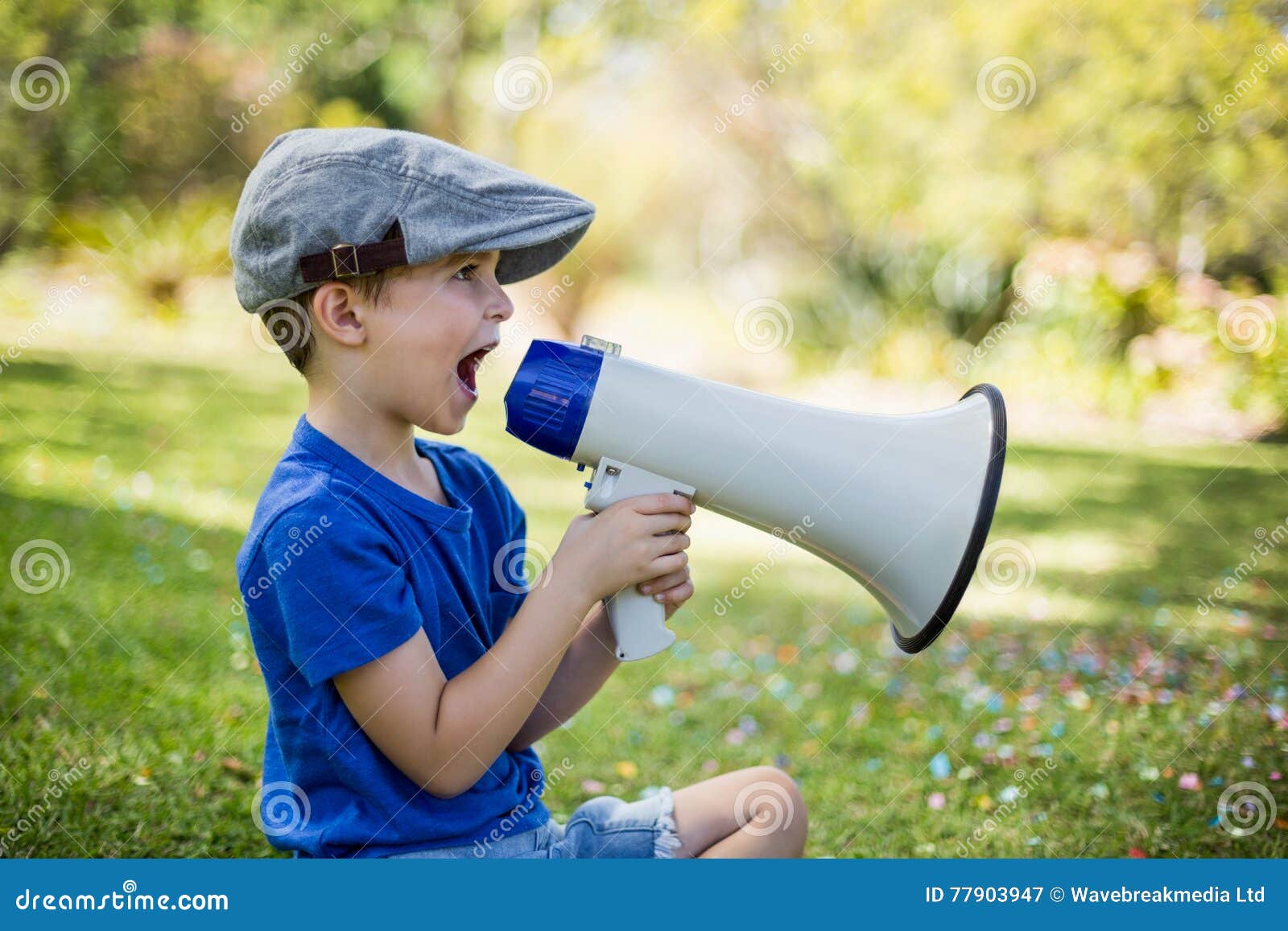 Young Boy Speaking on Megaphone Stock Image - Image of parkland ...