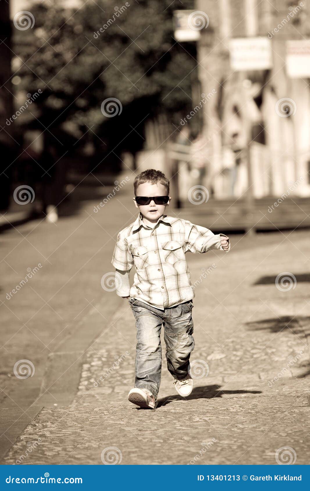 A Young Boy Struts His Stuff Stock Image - Image of spring, posing ...