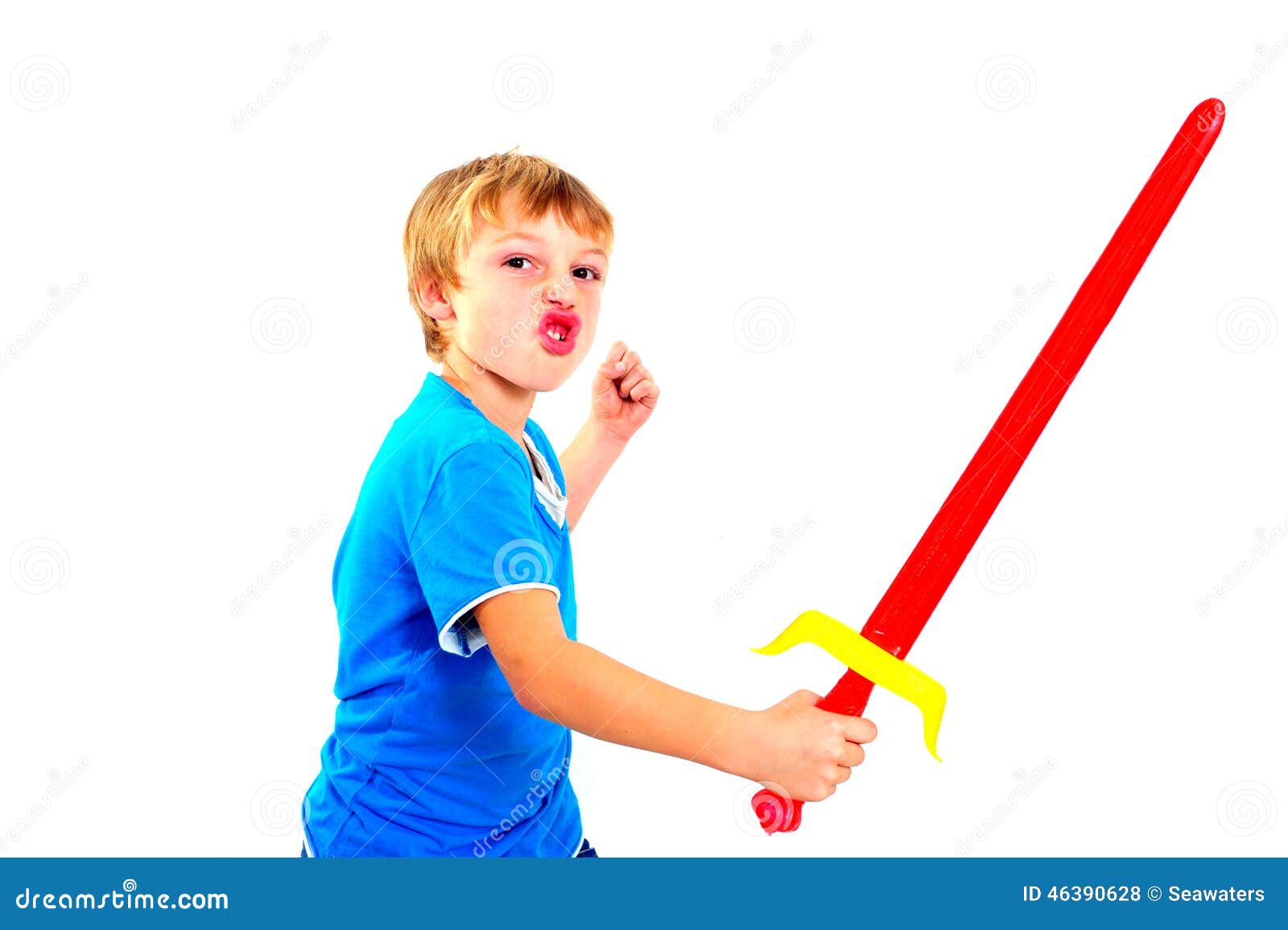 Young Boy in Studio Playing with Sword on White Background Stock Photo ...