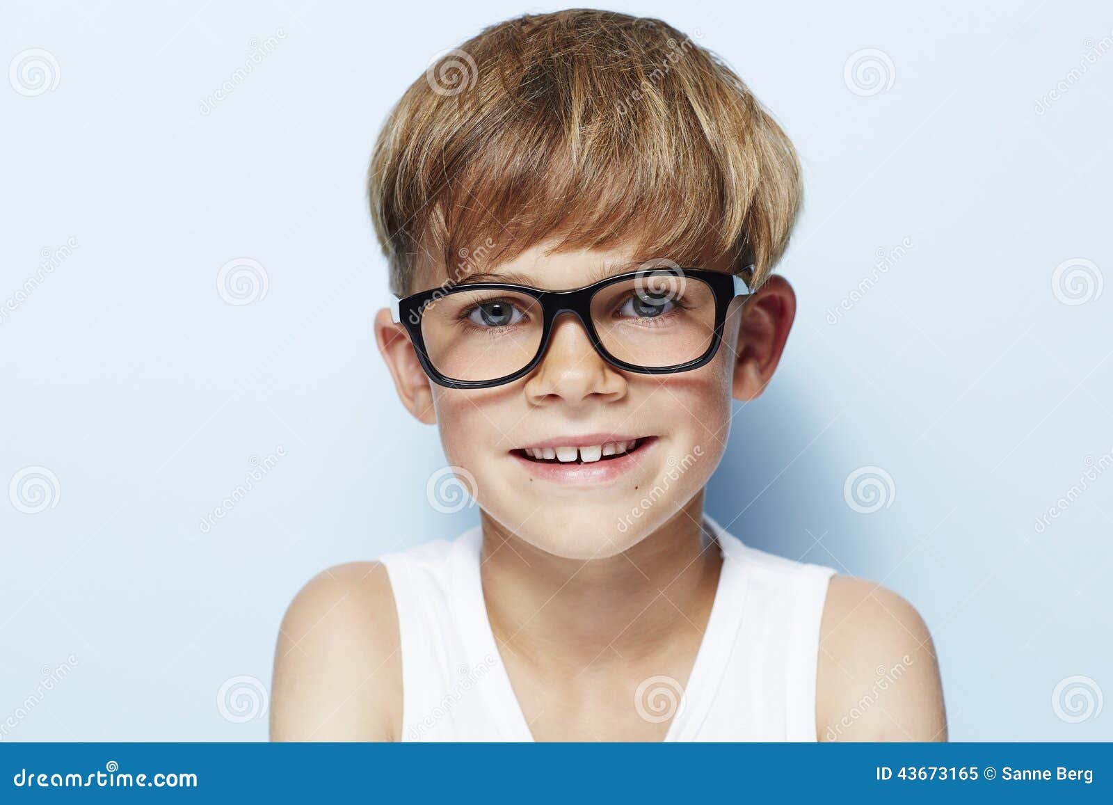 Young Boy in Studio, Smiling Stock Image - Image of inside, eyeglasses ...