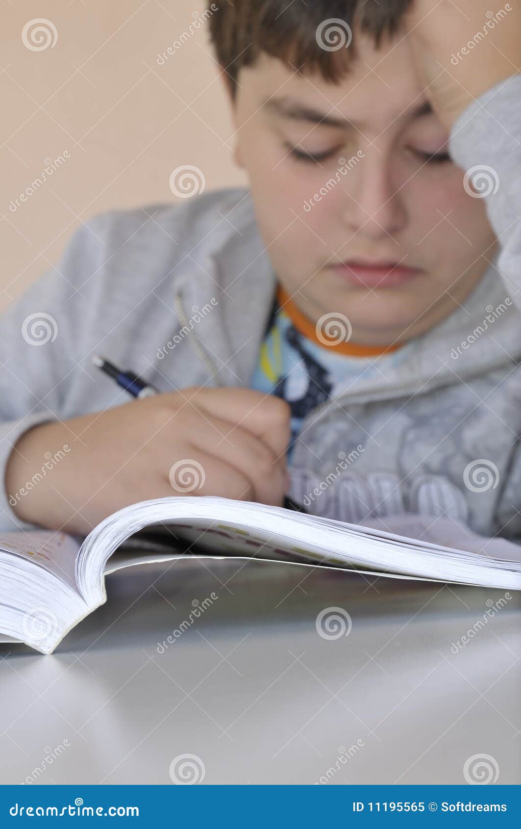 Young boy studying stock image. Image of face, book, hardworking - 11195565