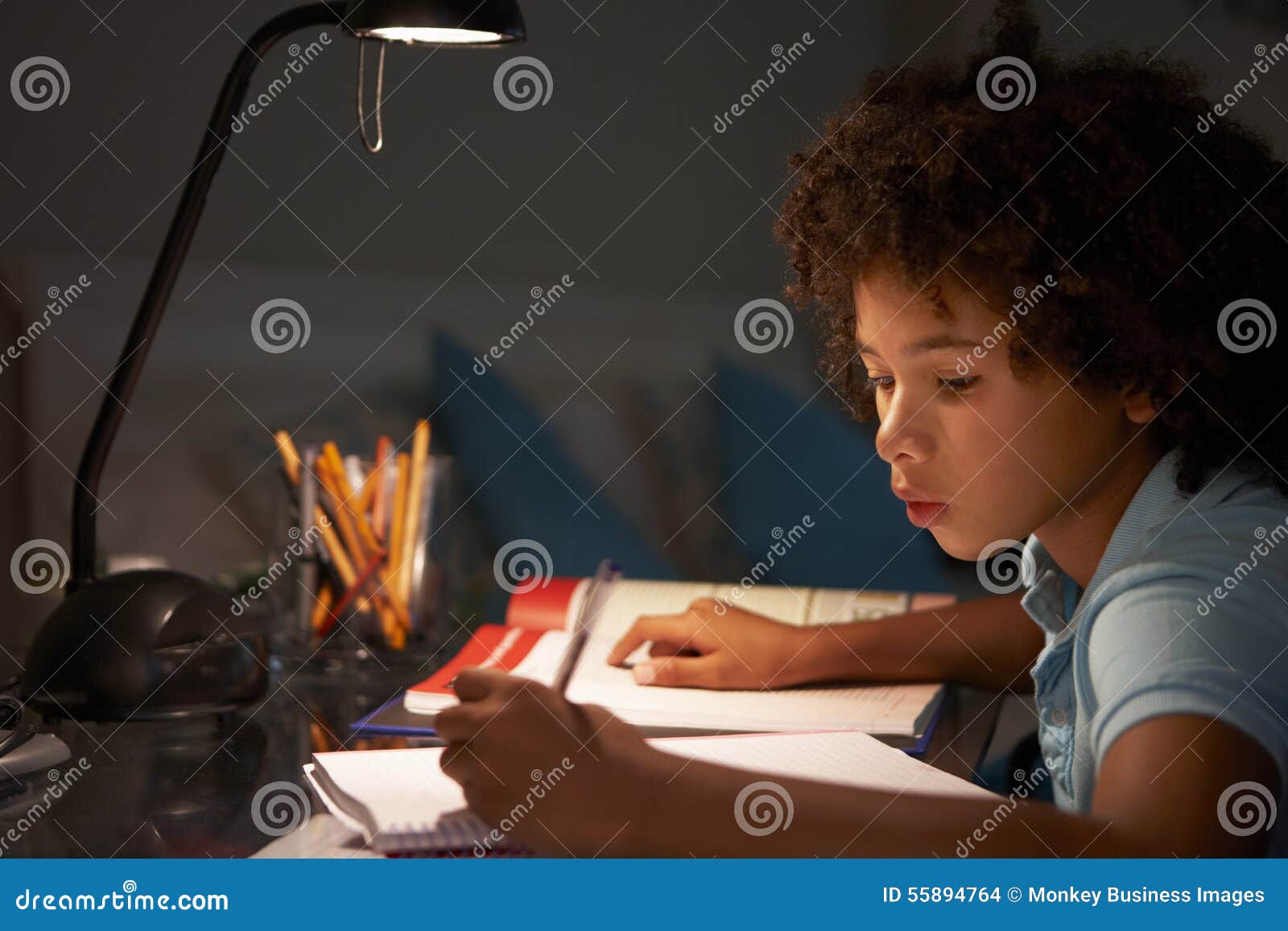Young Boy Studying at Desk in Bedroom in Evening Stock Photo - Image of ... Young Boy Studying at Desk in Bedroom in Evening Stock Photo - Image of ...