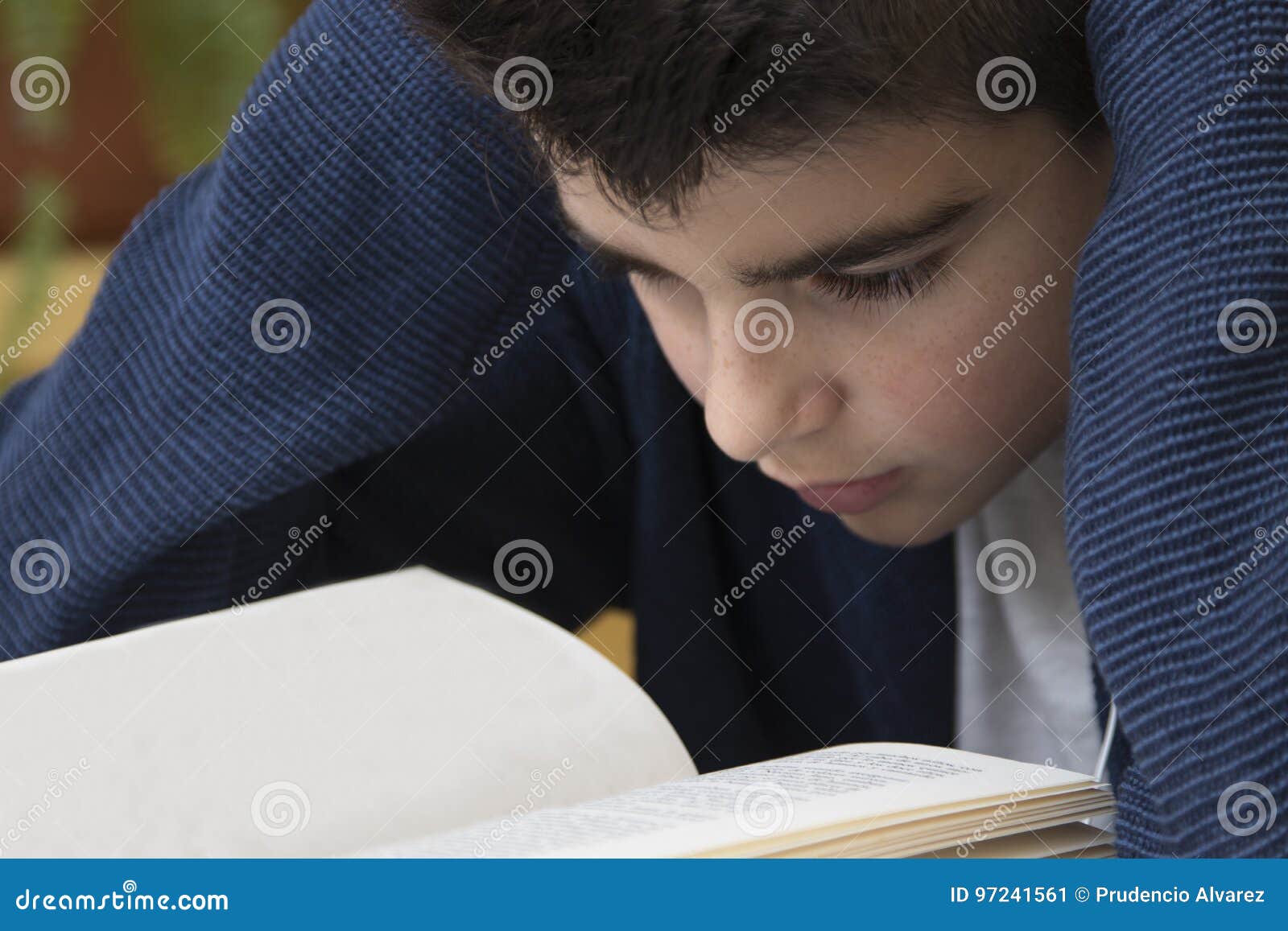 Boy studying book stock image. Image of school, library - 97241561