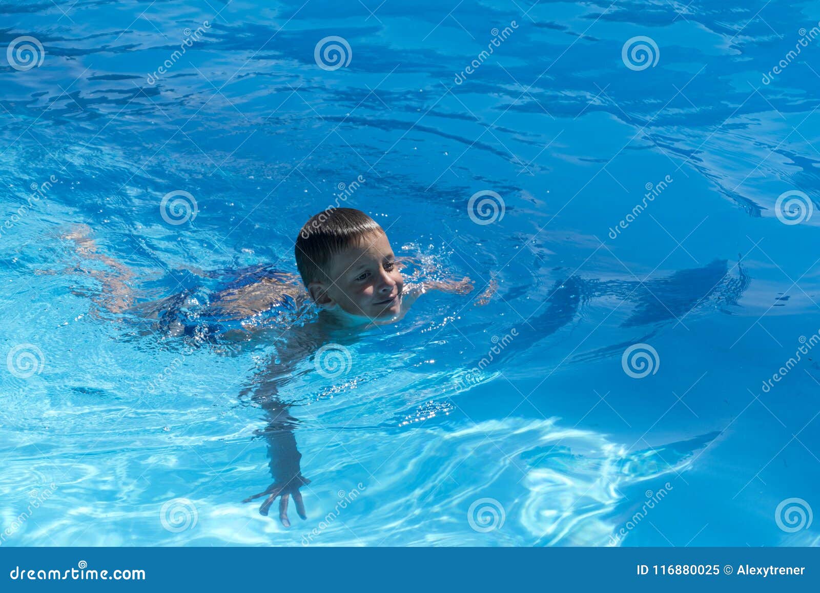 Young Boy Swimmimng in the Pool for First Time Stock Image - Image of ...