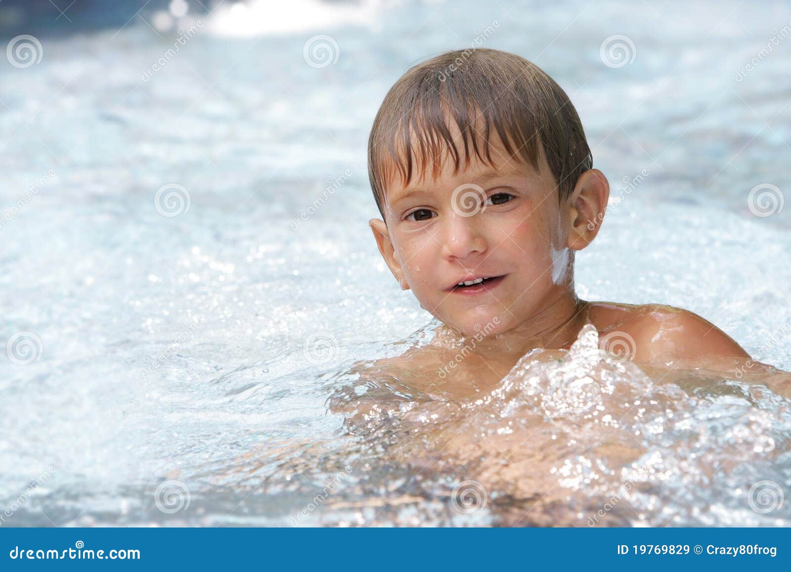 Young boy swimming in pool stock image. Image of waterpool - 19769829