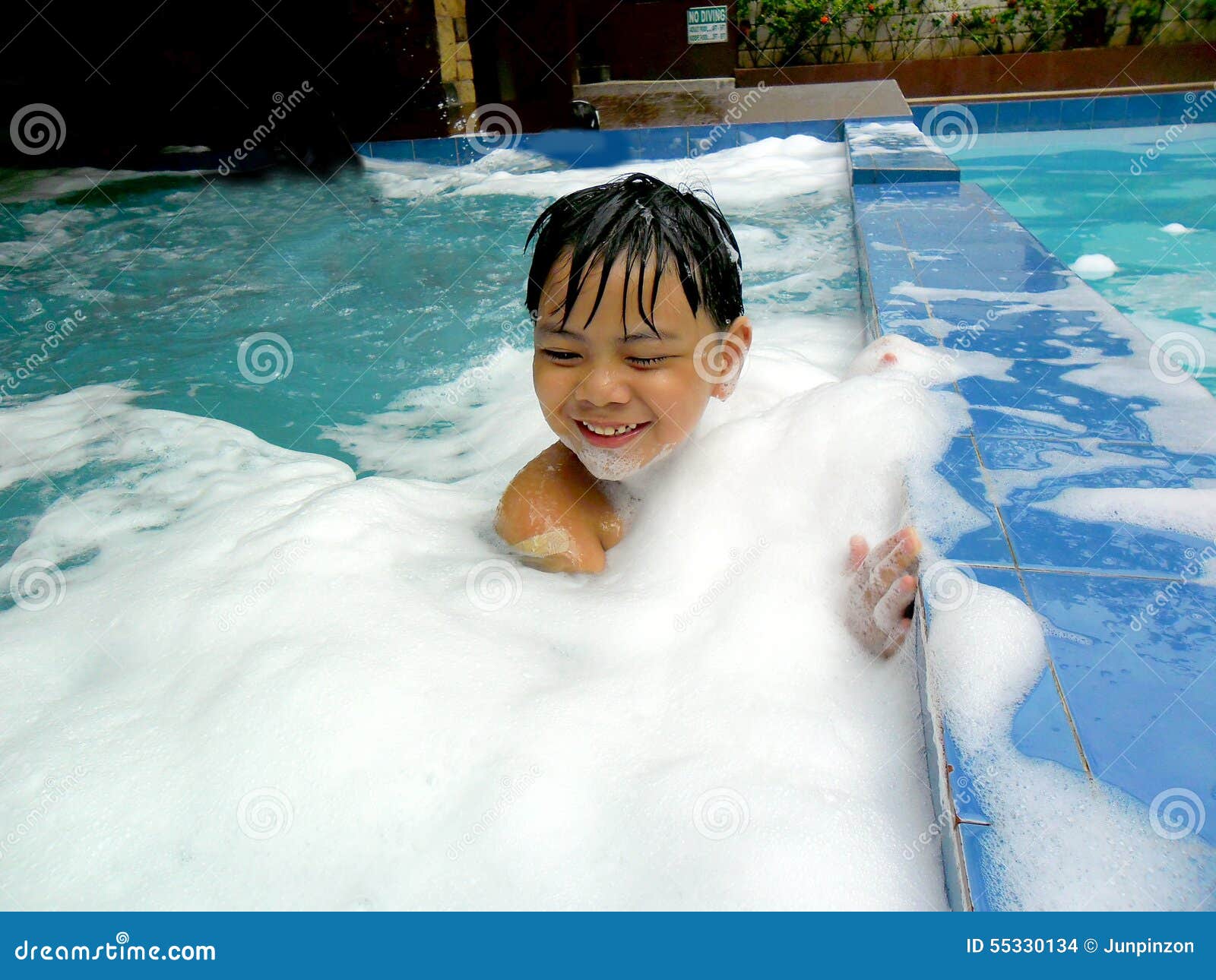 Young Boy in a Swimming Pool with Bubbles Stock Photo - Image of summer ...