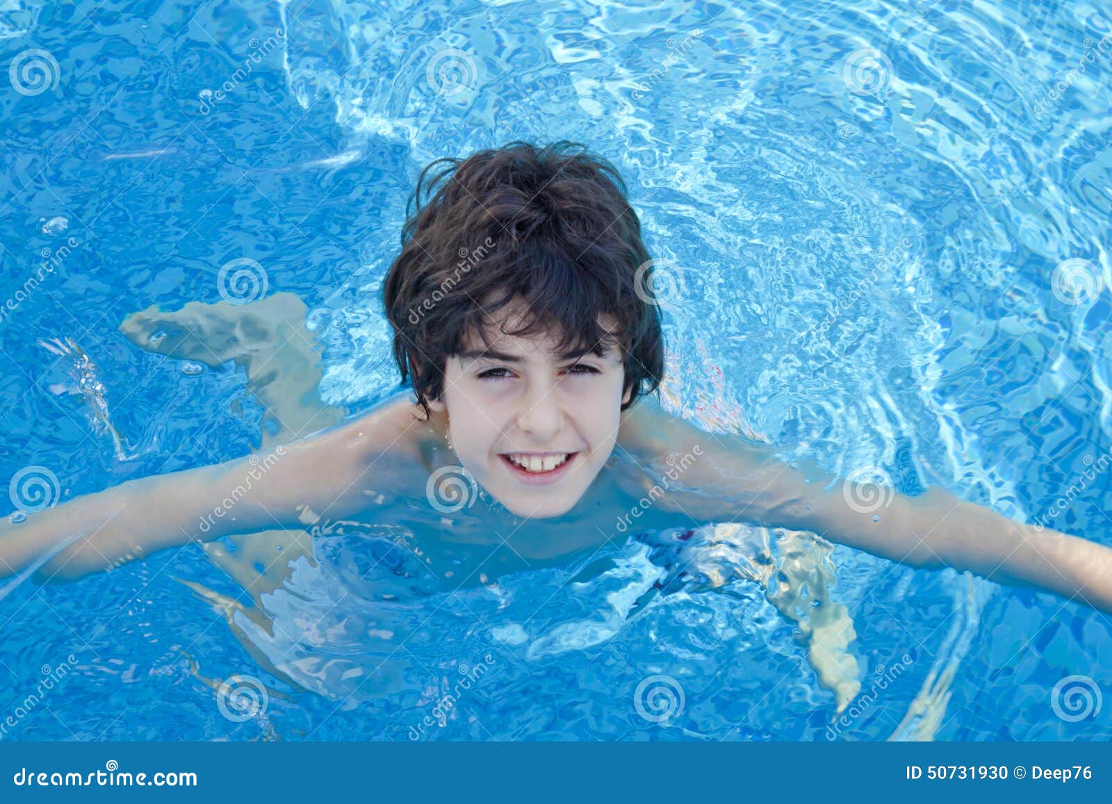 Young Boy Is In The Swimming Pool Stock Photo - Image: 50731930