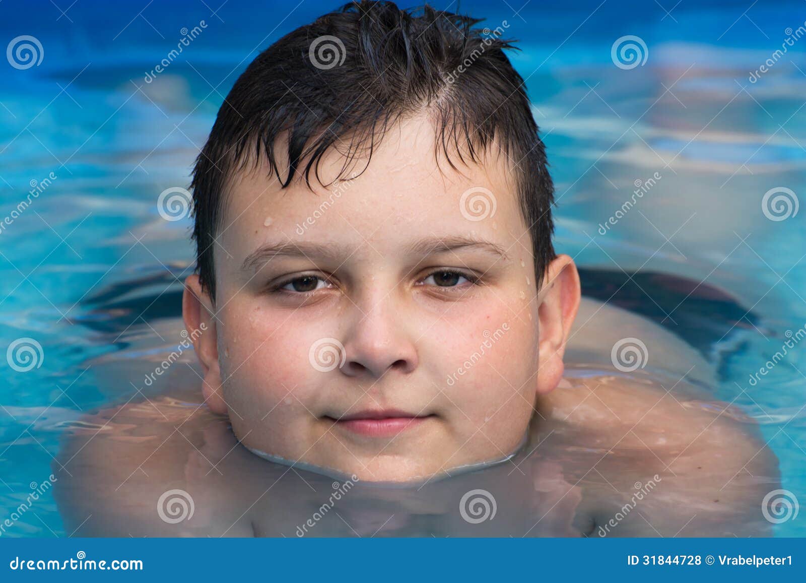 Young boy in swimming pool stock photo. Image of camp - 31844728