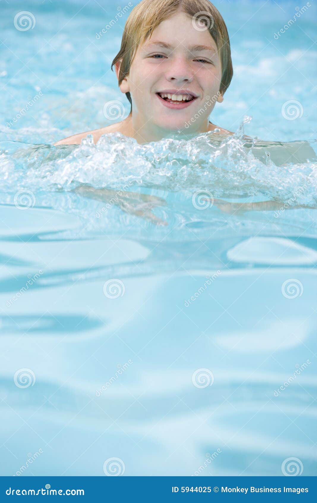 Young Boy In Swimming Pool Smiling Royalty-Free Stock Photography ...