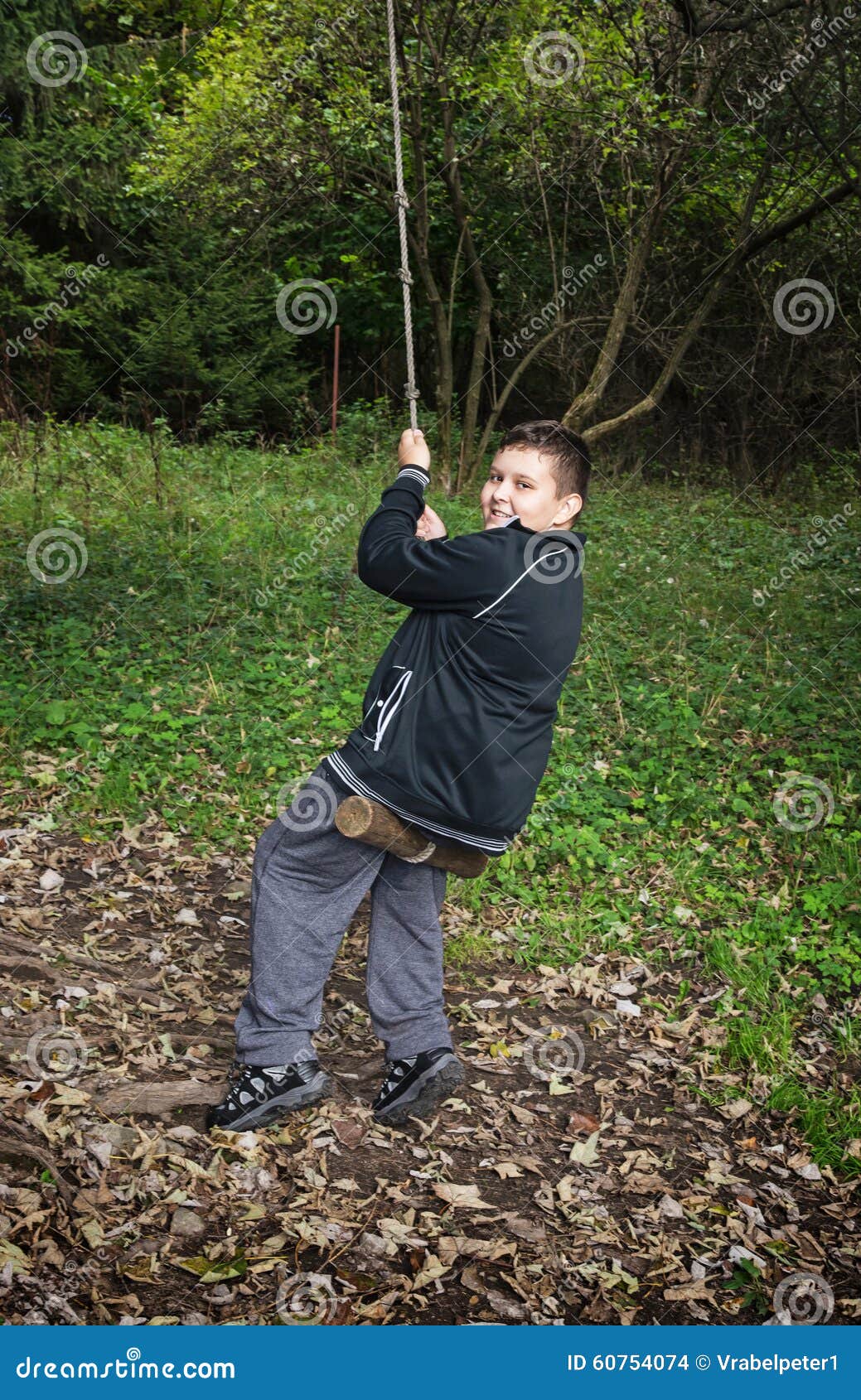 Young Boy Swing on the Rope Stock Photo - Image of play, relax: 60754074