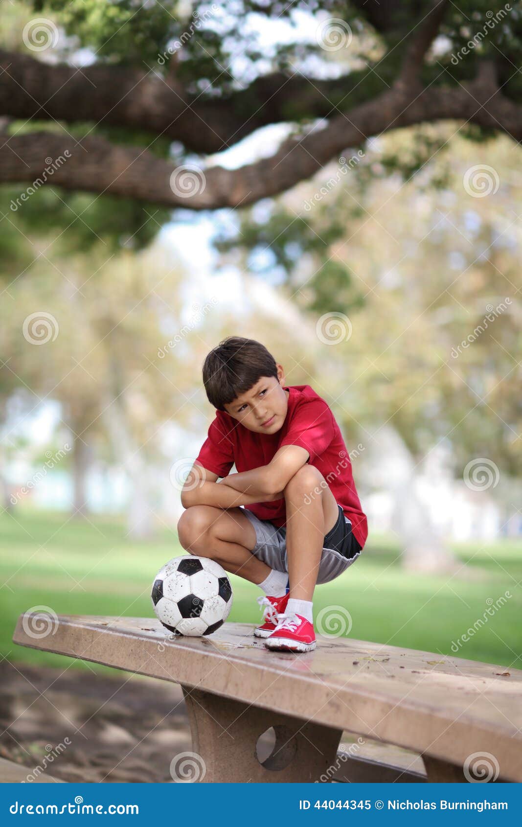 Young Boy on Table with Ball Stock Image - Image of cute, handsome ...