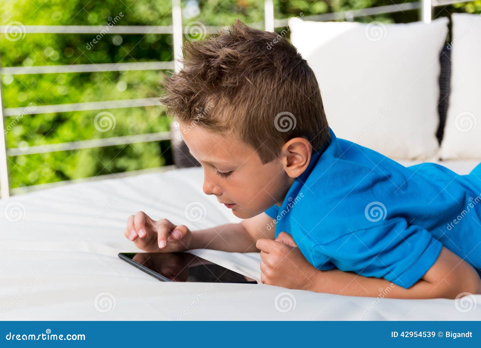 Young boy with a tablet stock image. Image of child, summer - 42954539