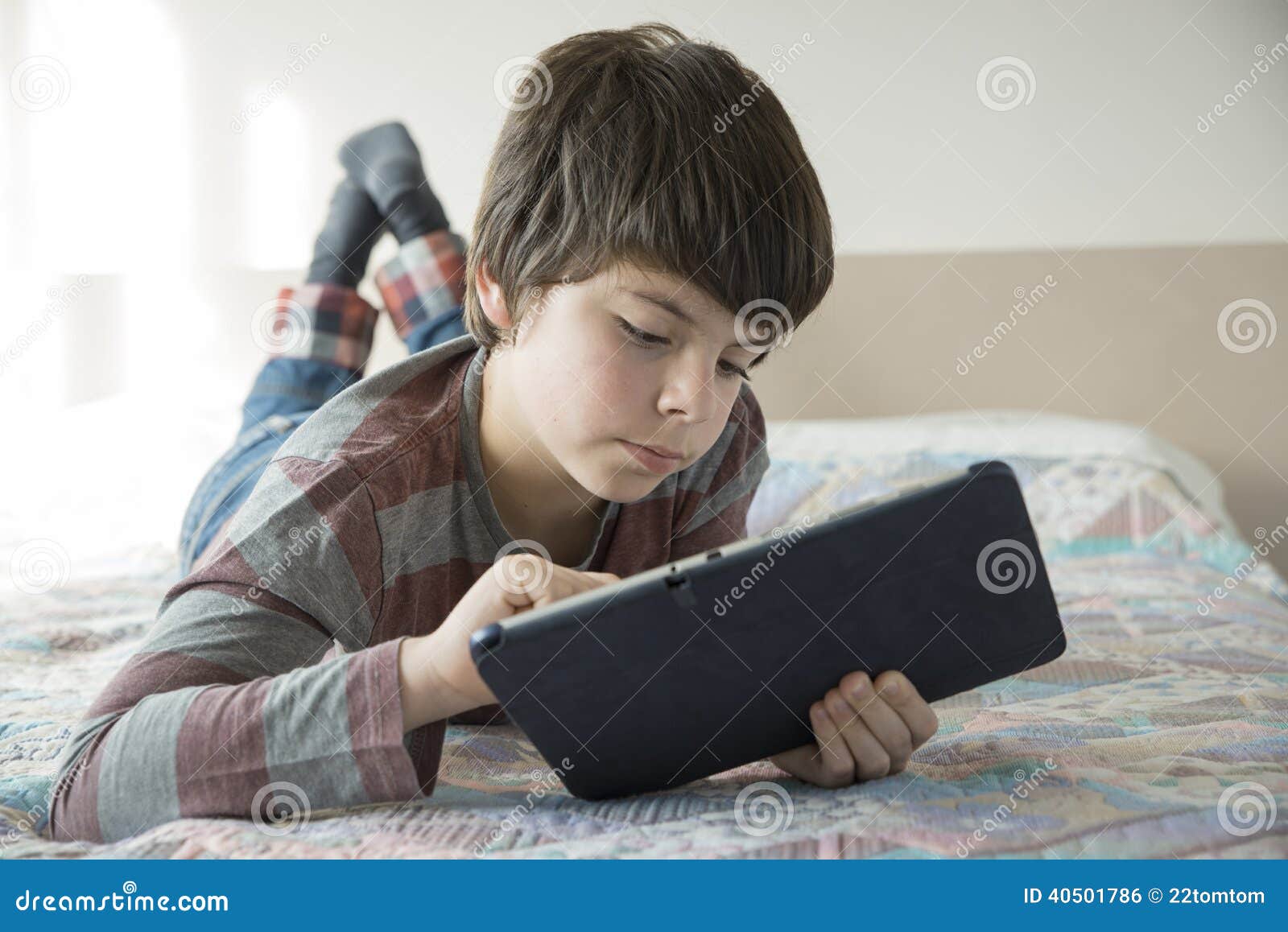 Young Boy and a Tablet Digital Stock Photo - Image of years, room: 40501786