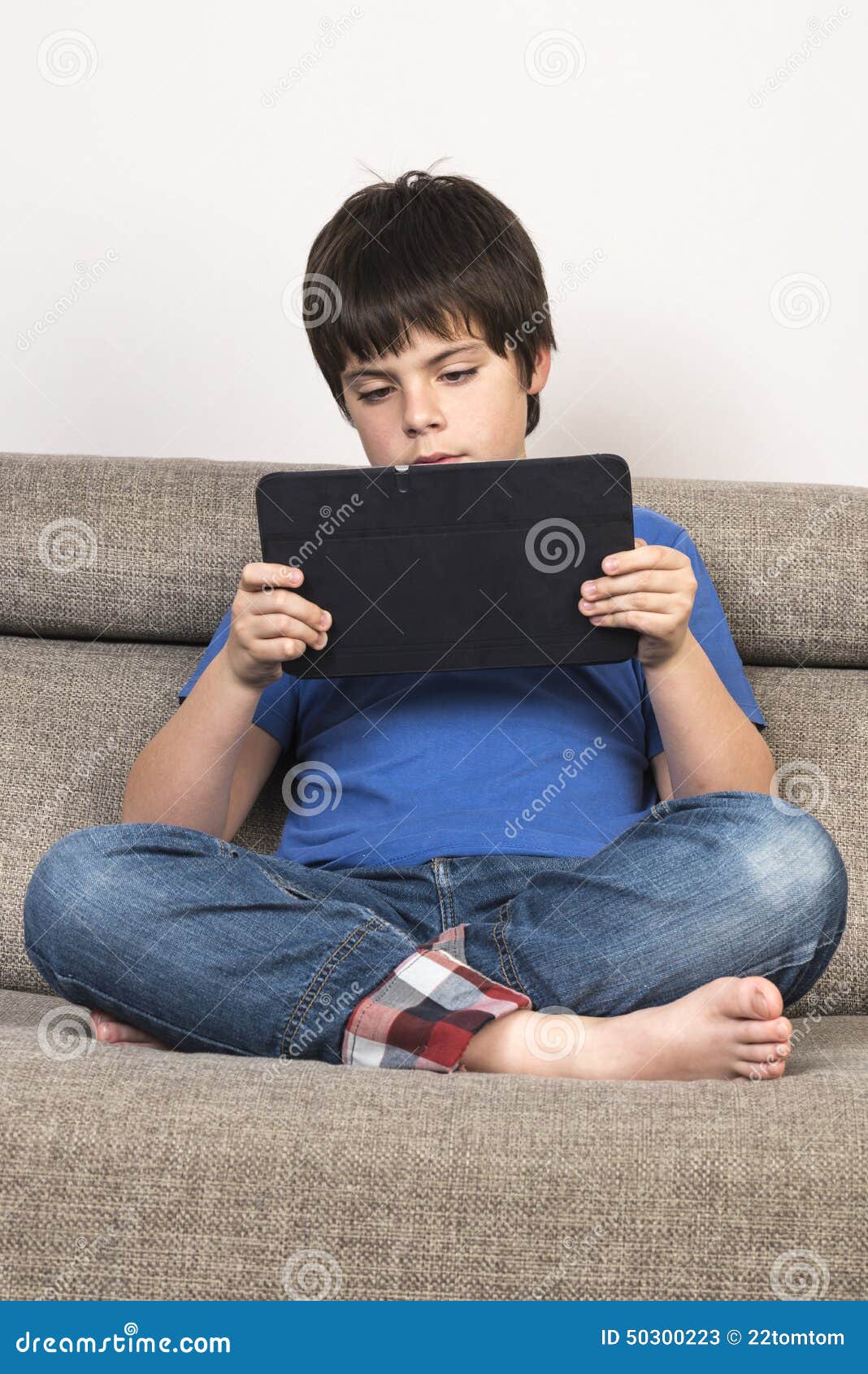 Young Boy and a Tablet Digital Stock Image - Image of room, computer ...