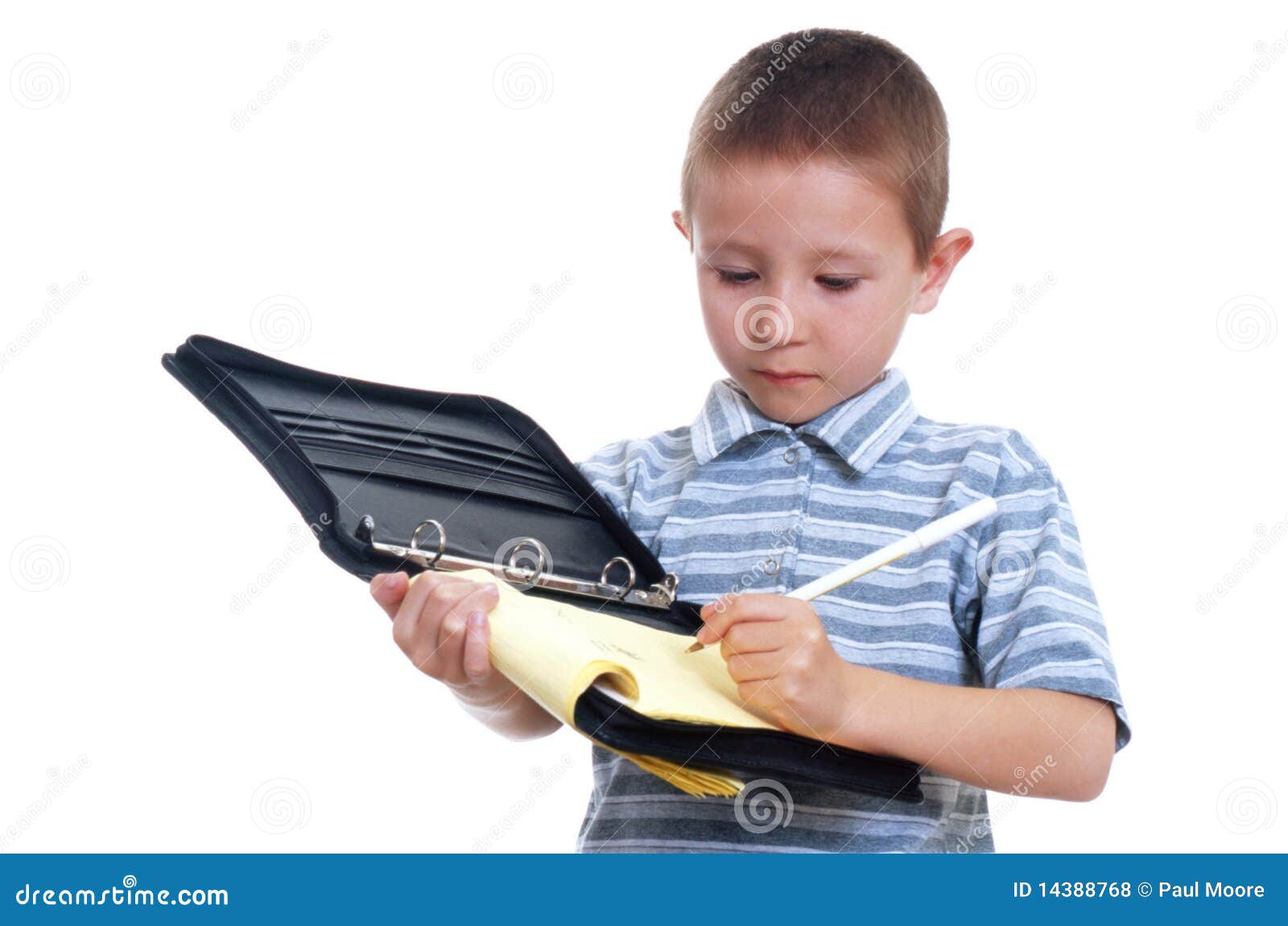 Young Boy Taking Notes stock photo. Image of business - 14388768