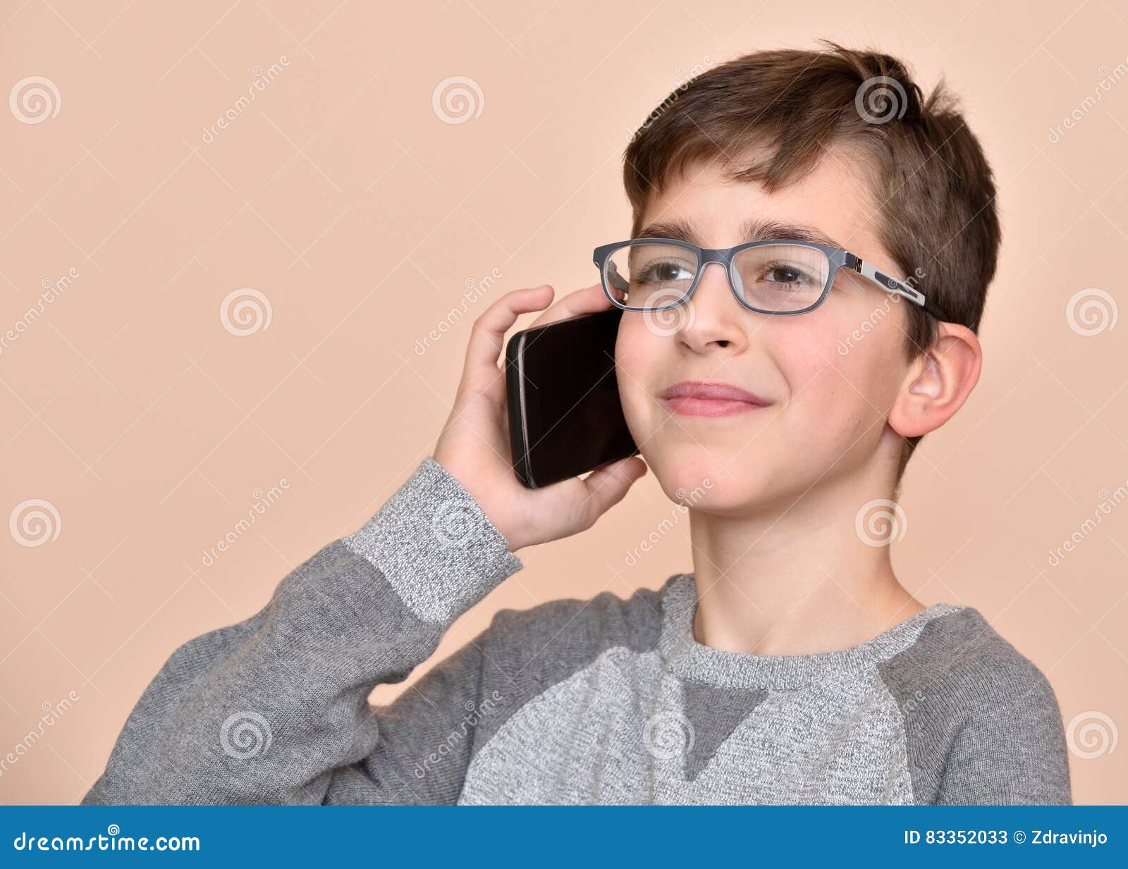 Young Boy Talking on His Smart Phone Stock Image - Image of happiness ...
