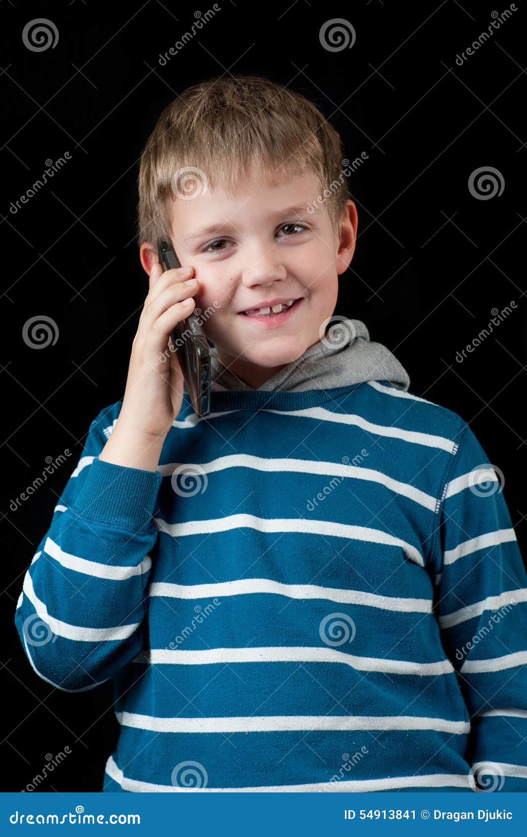 Young Boy Talking on Mobile Phone Stock Image - Image of arms, screen ...