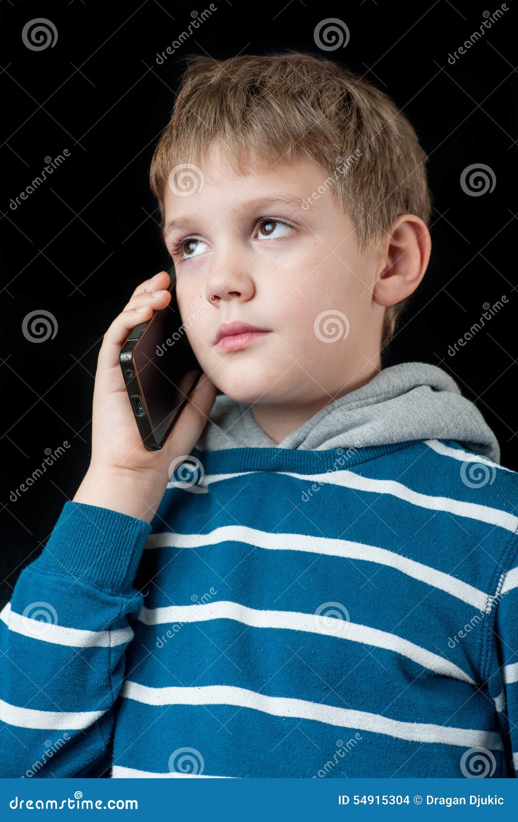 Young Boy Talking on Mobile Phone Stock Photo - Image of beautiful ...