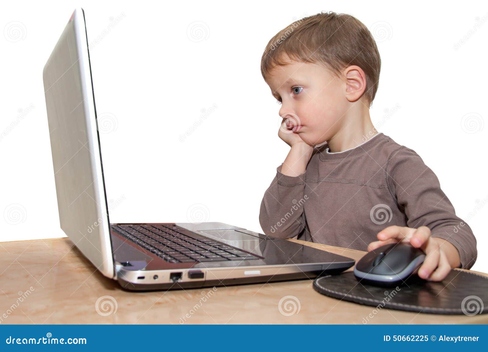 Young Boy Thinking in Front of Laptop Stock Image - Image of ...