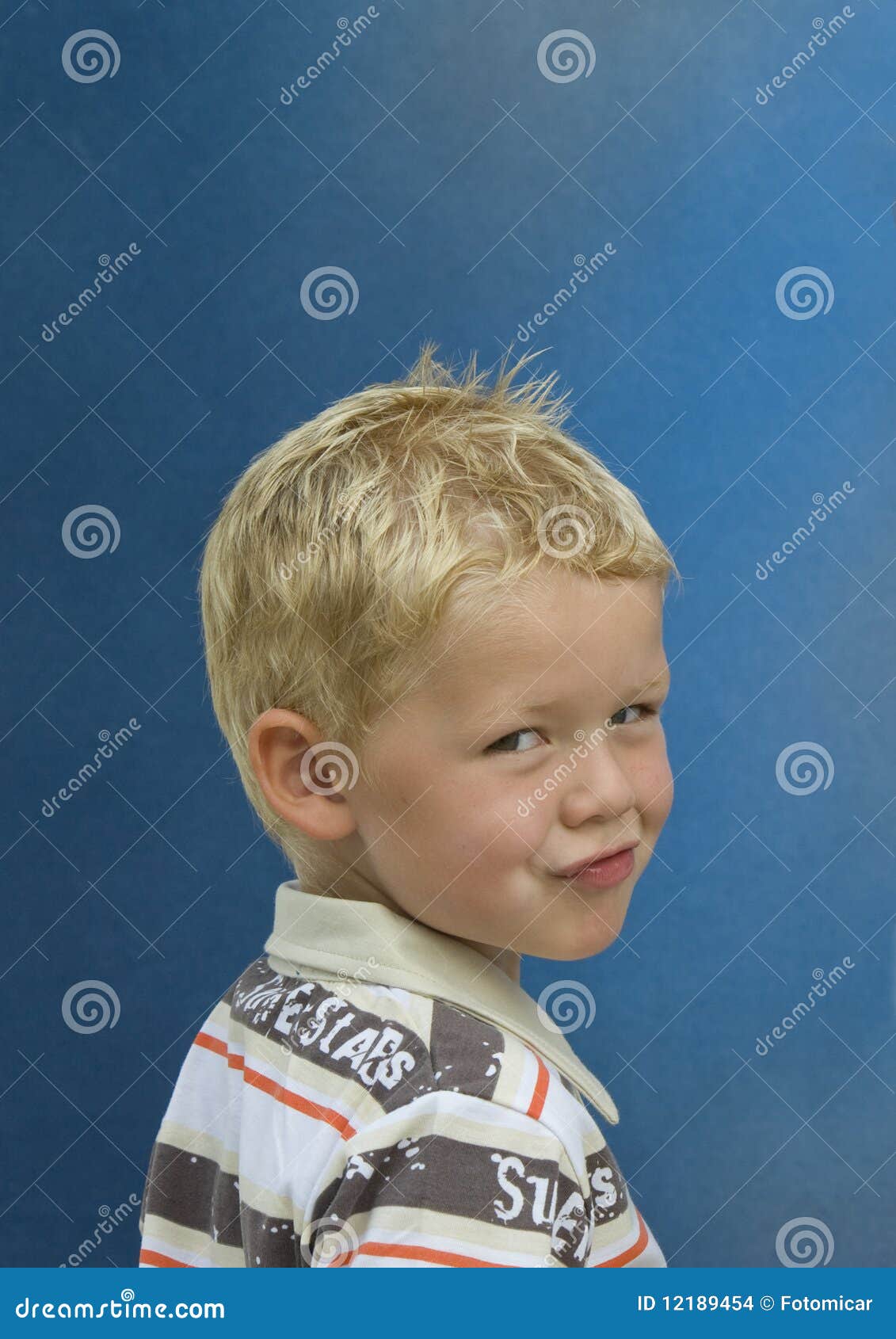 Young Boy Turning Back stock photo. Image of closeup - 12189454