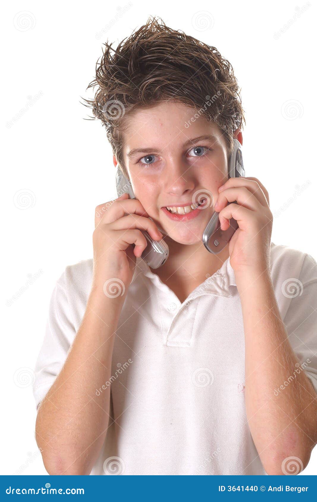 Young Boy on Two Cell Phone Vertical Stock Photo - Image of little ...
