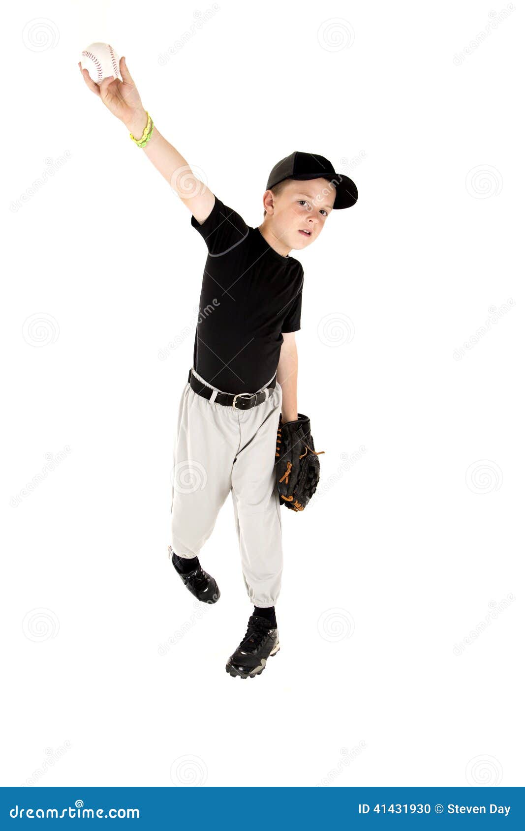 Young Boy in Uniform Pitching a Baseball Right Handed Stock Photo ...