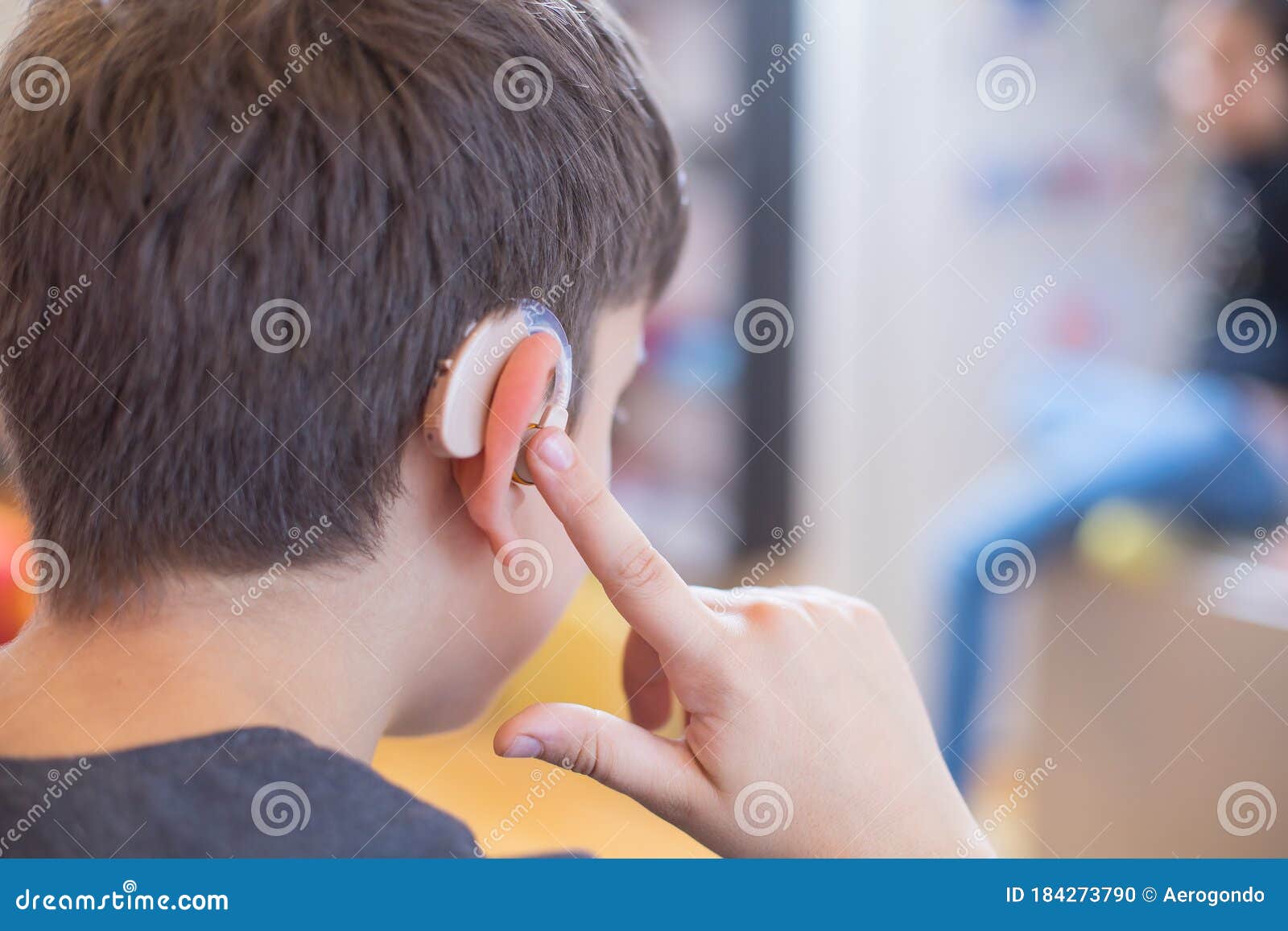 Young Boy Using Hearing Aid Stock Photo - Image of diagnostic, deaf ...