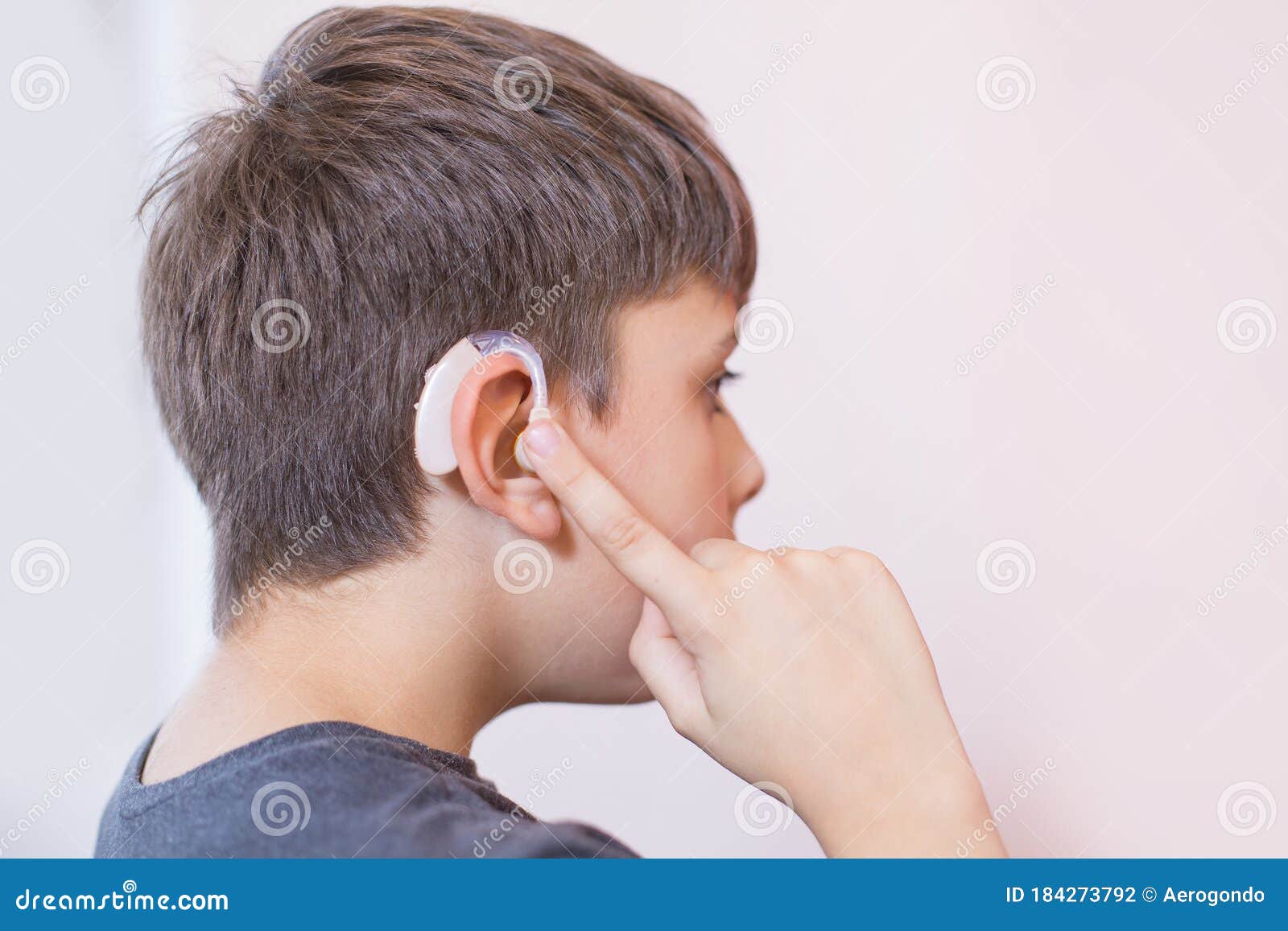 Young Boy Using Hearing Aid Royalty-Free Stock Image | CartoonDealer ...