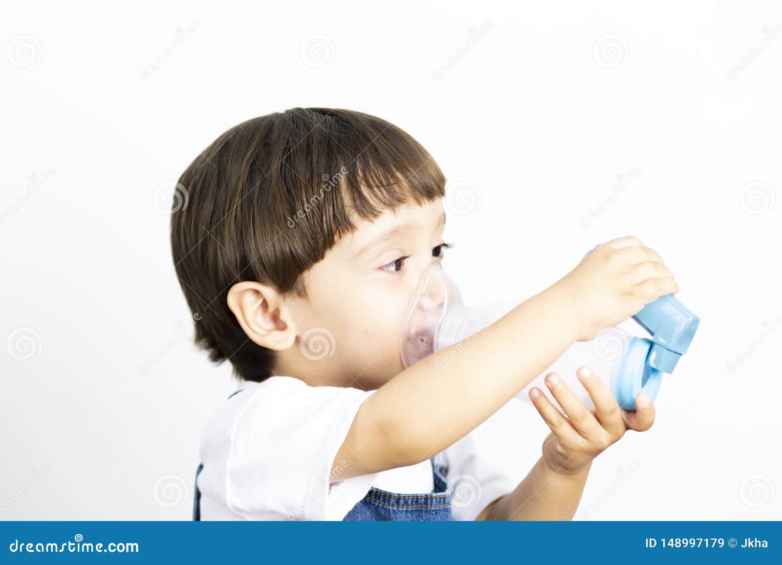 Young Boy Using Inhaler stock image. Image of latin - 148997179