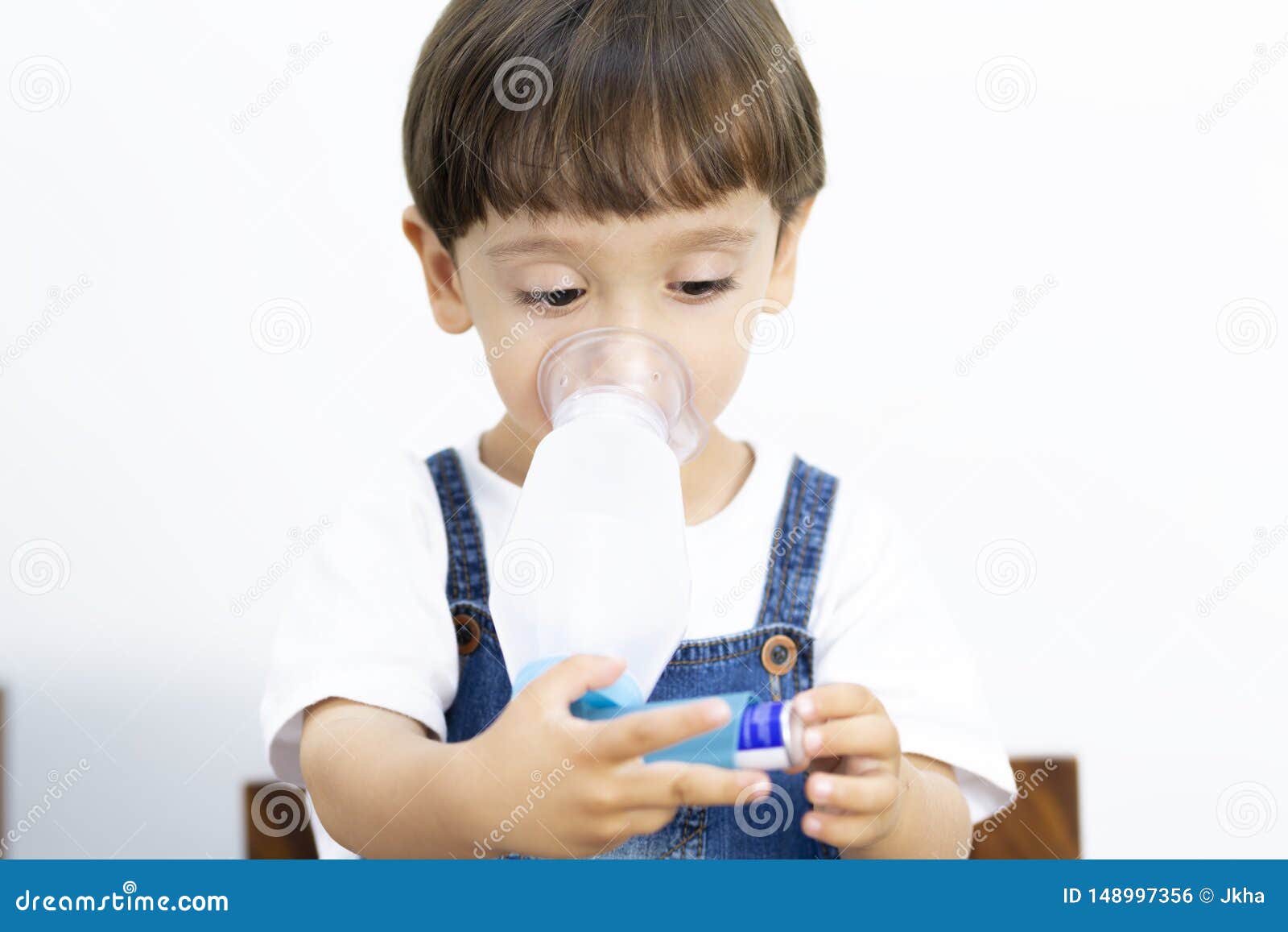 Young Boy Using Inhaler stock photo. Image of care, cute - 148997356