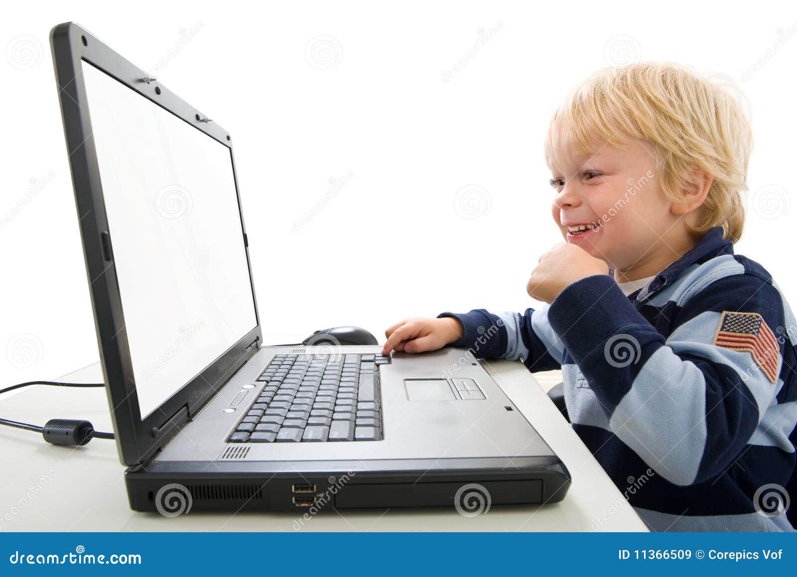 Young Boy Using Laptop stock image. Image of inside, hair - 11366509