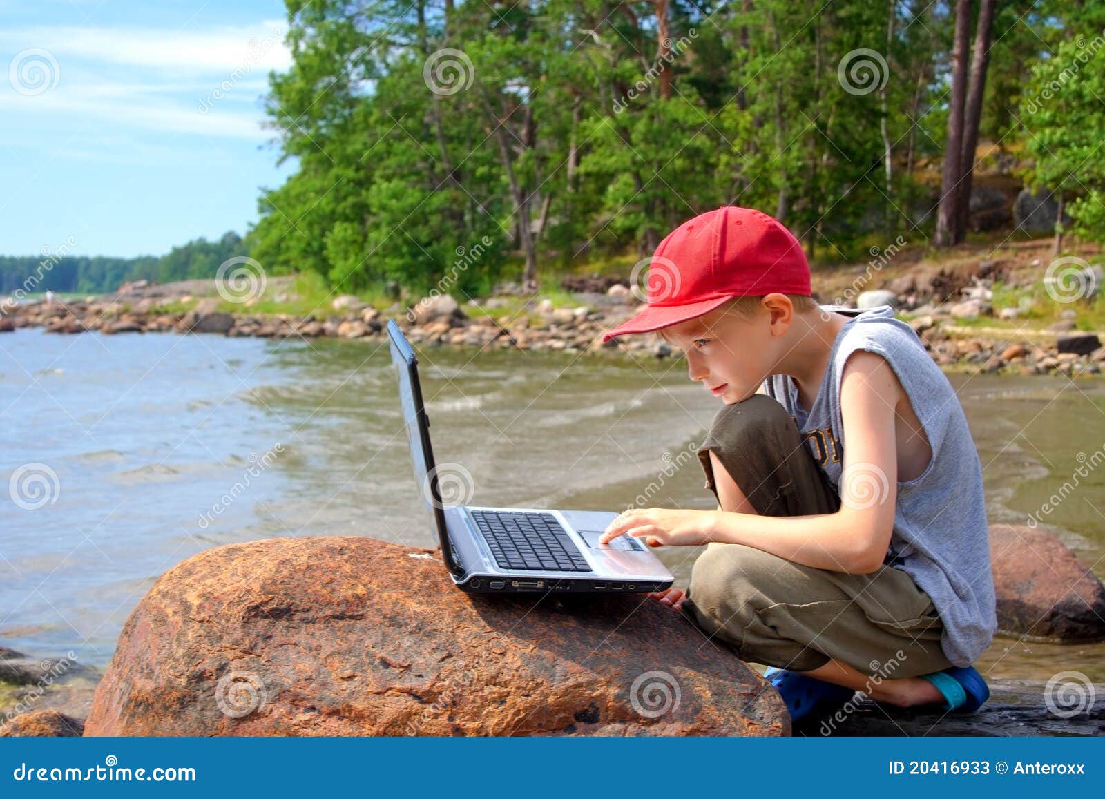 Young boy using a laptop stock image. Image of male, keyboard - 20416933