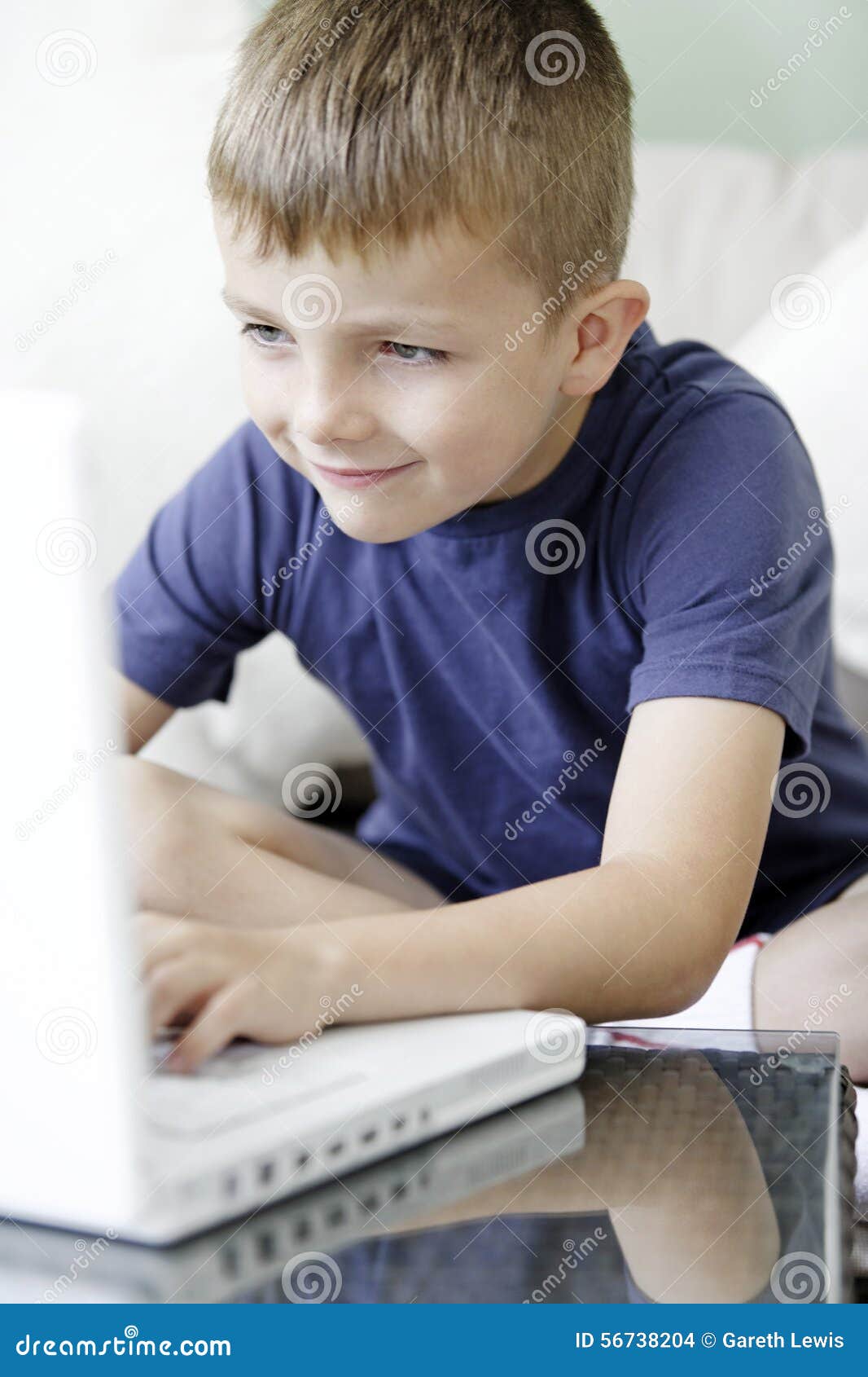 Young Boy Using a Laptop Computer Stock Photo - Image of school ...