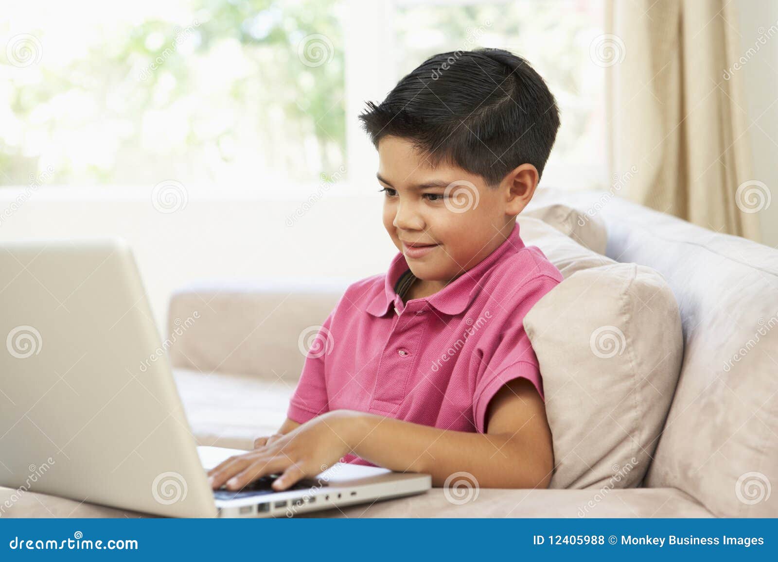 Young Boy Using Laptop at Home Stock Photo - Image of computer, home ...