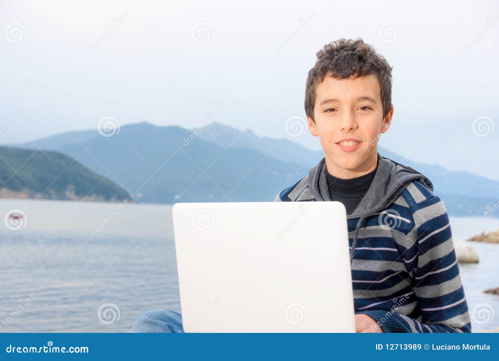 Young Boy Using Laptop Outside. Stock Image - Image of meadow ...