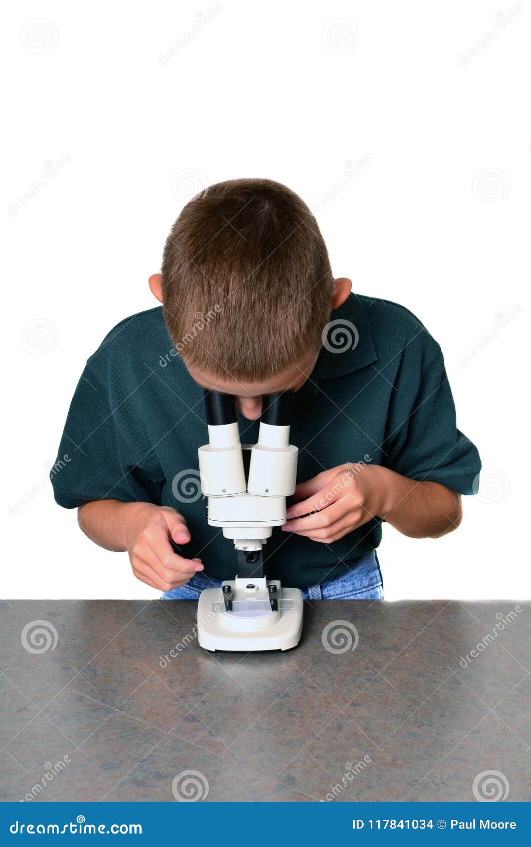Young Boy Using a Microscope Stock Photo - Image of education ...