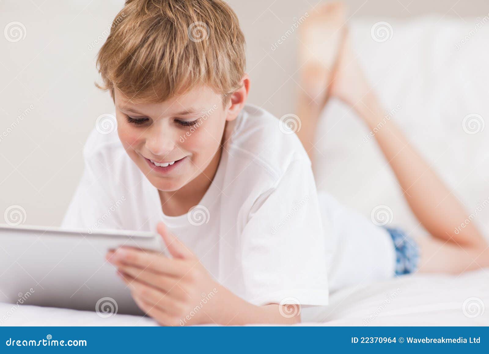 Young Boy Using a Tablet Computer Stock Photo - Image of leisure ...