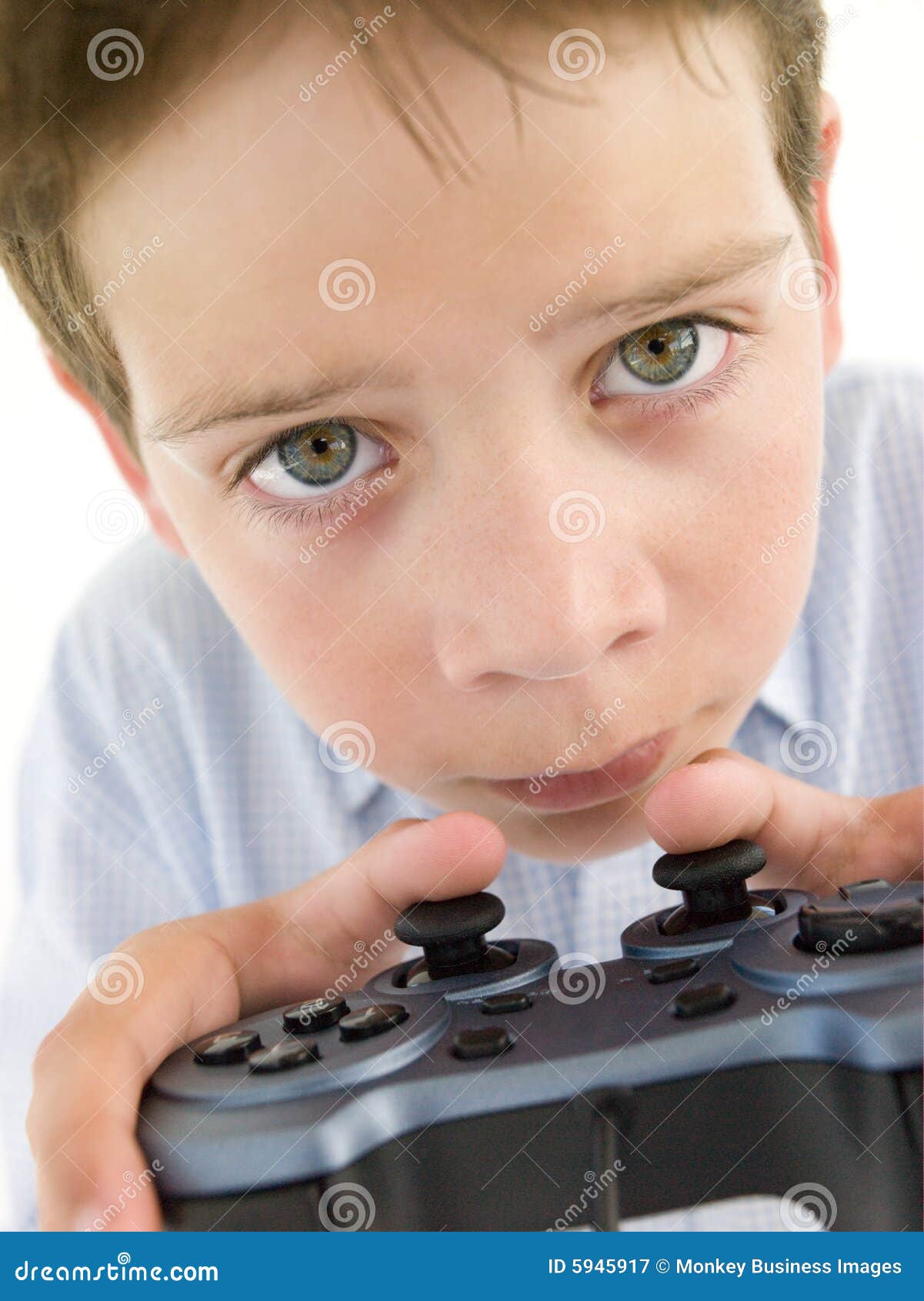 Young Boy Using Videogame Controller Stock Image - Image of shoulders ...