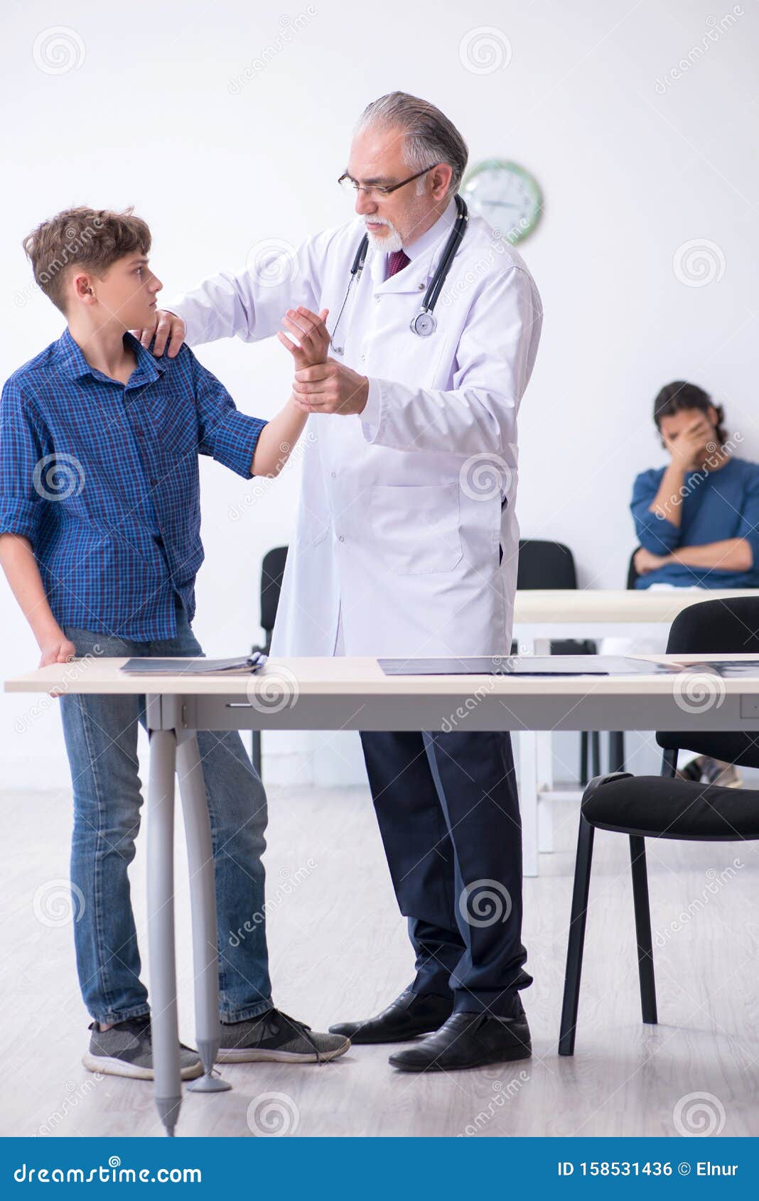 Young Boy Visiting Doctor in Hospital Stock Photo - Image of medical ...